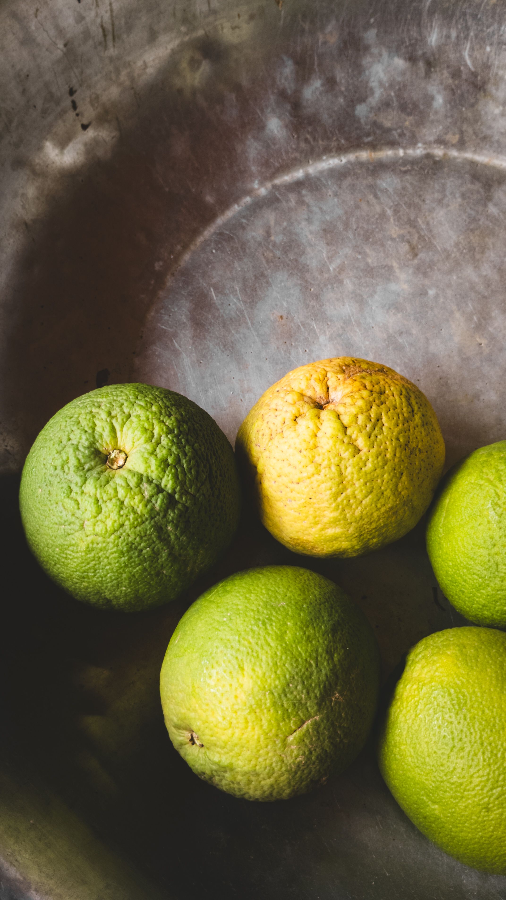 Fresh Green and Yellow Limes Arrangement · Free Stock Photo