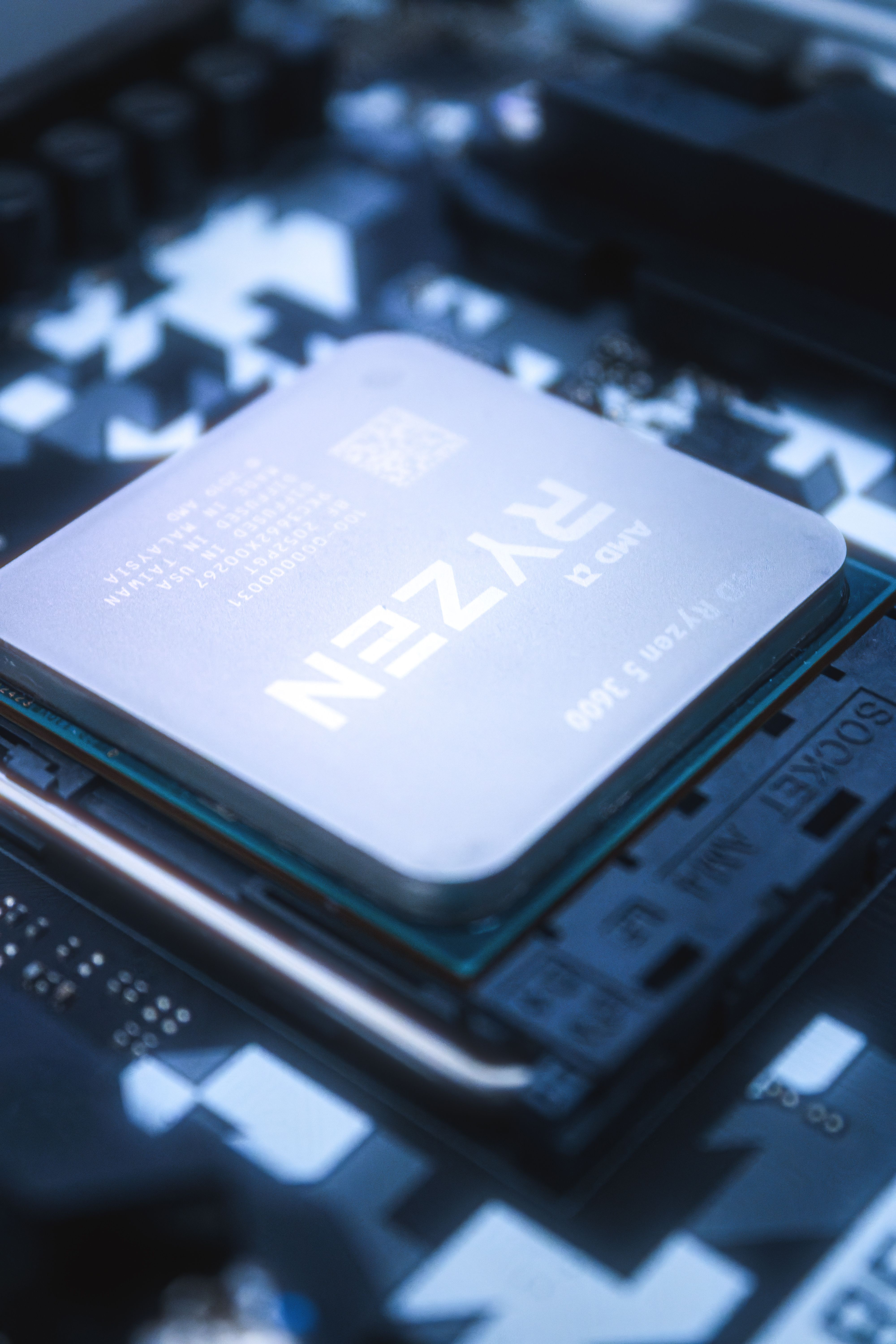 Close-Up of a Ryzen CPU on Motherboard · Free Stock Photo