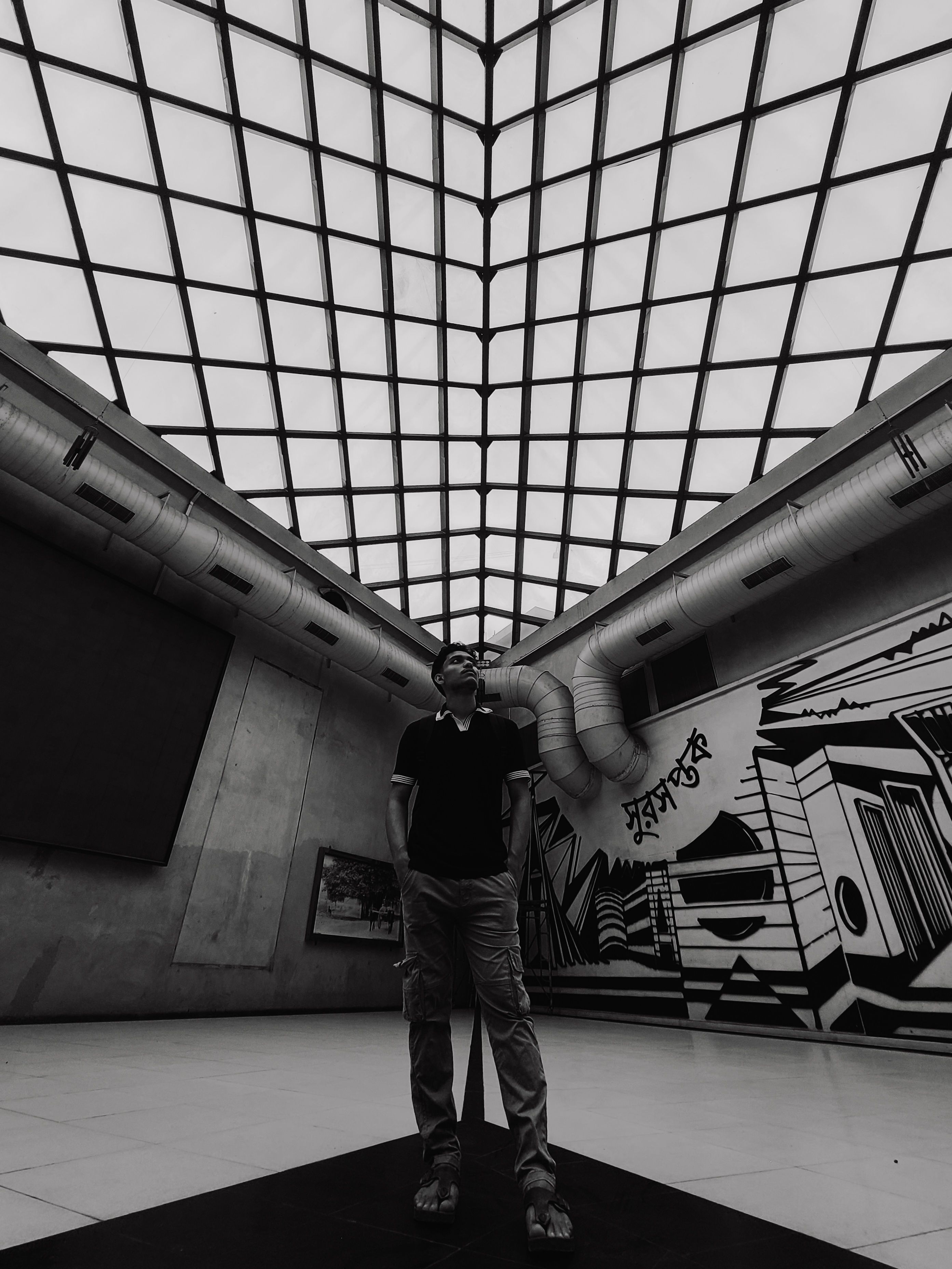 Monochrome Portrait in Modern Atrium · Free Stock Photo