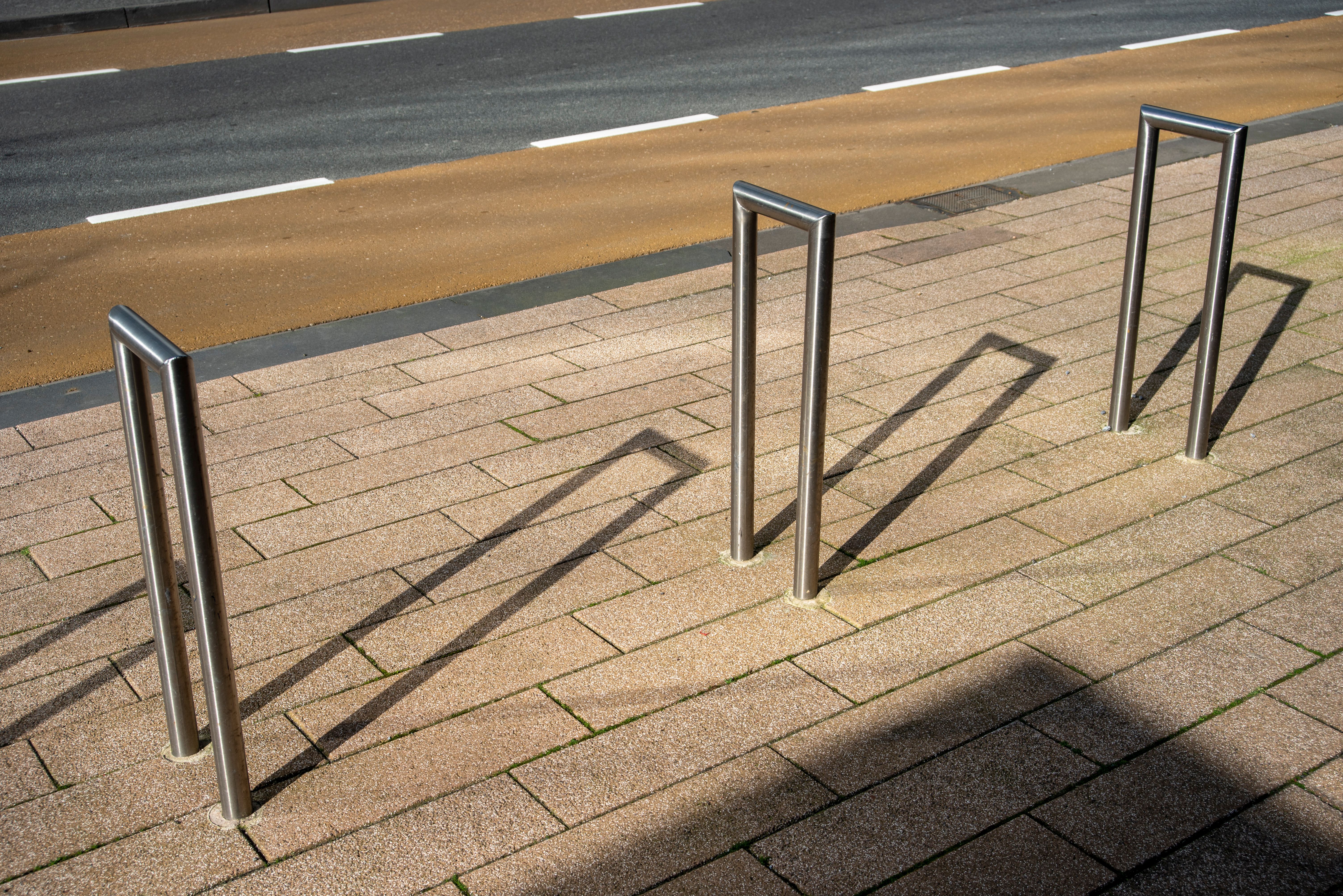 Modern Urban Cycle Stand with Shadows · Free Stock Photo
