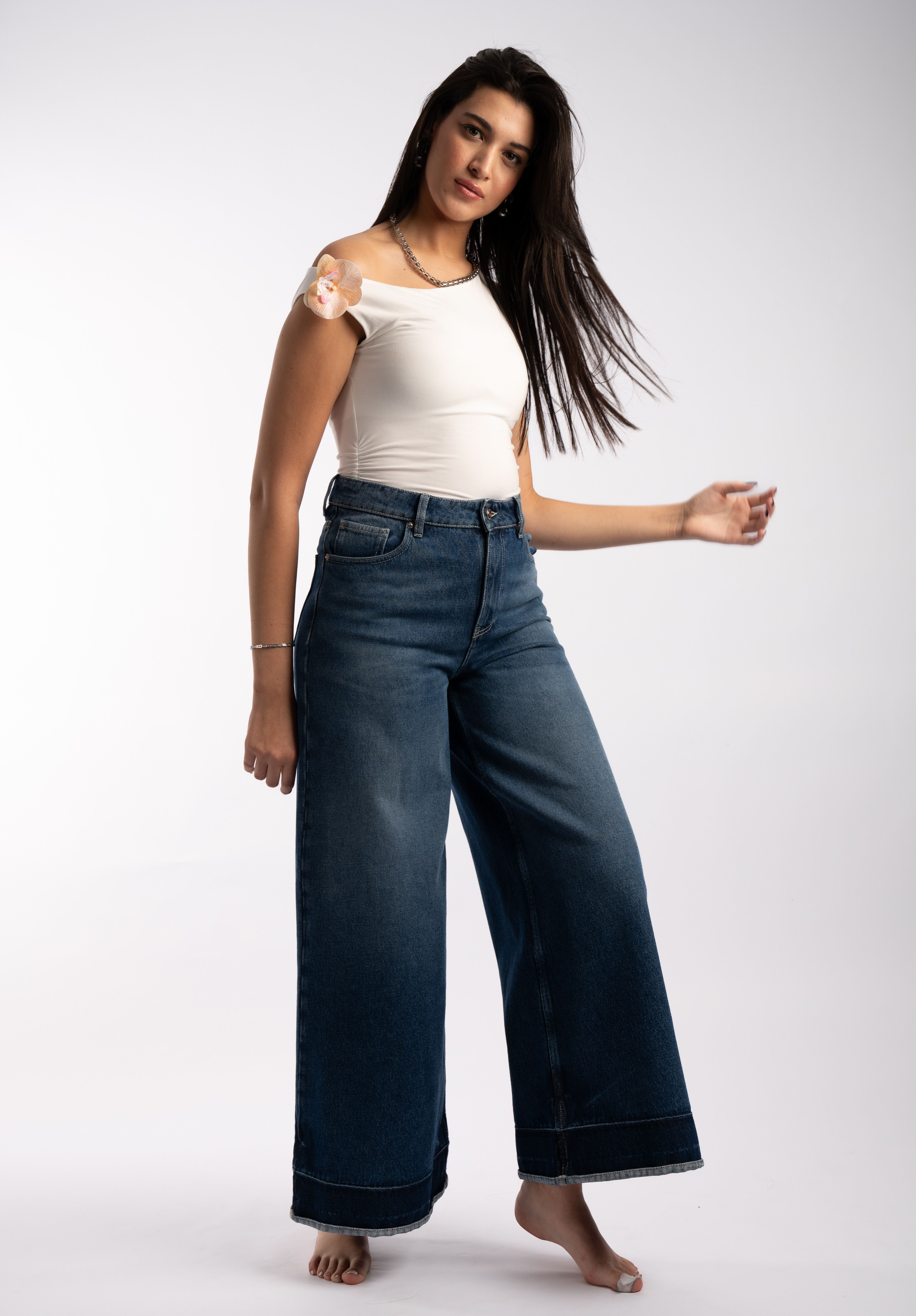 Modern Fashion Portrait of a Woman in Jeans · Free Stock Photo