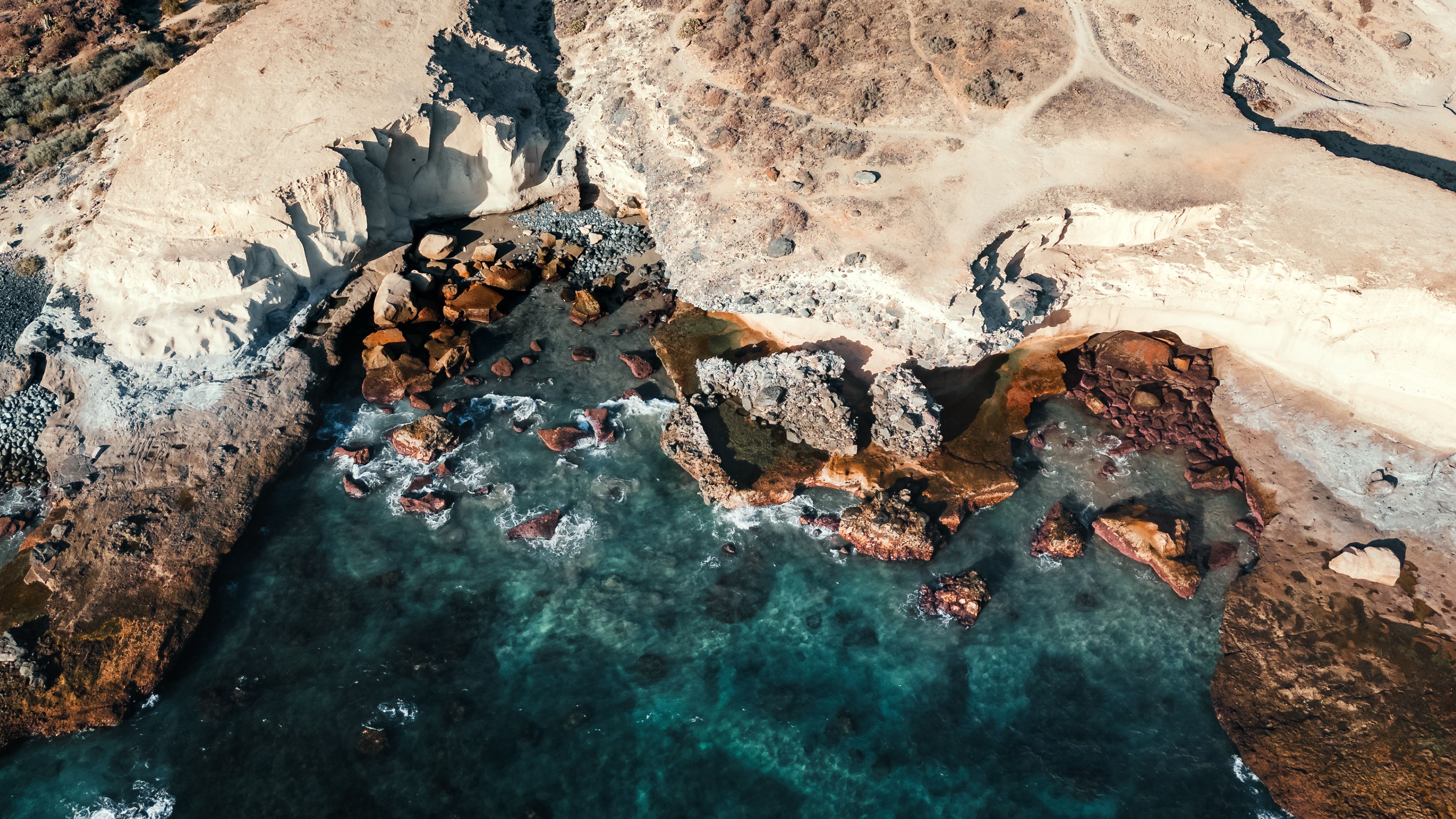 Aerial View of Rocky Coastline in La Caleta, Spain · Free Stock Photo