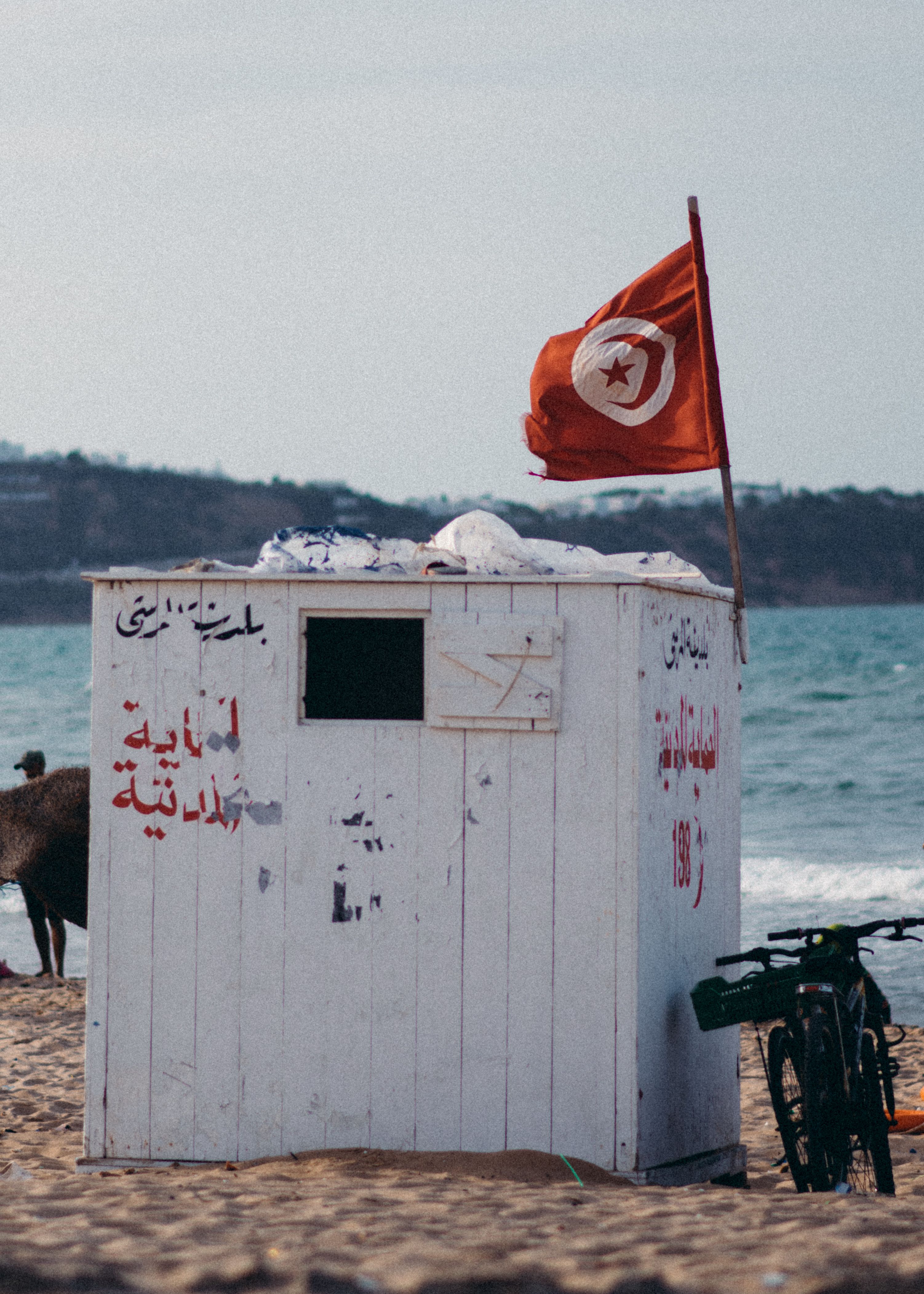 Beach Hut with Tunisian Flag at La Marsa · Free Stock Photo