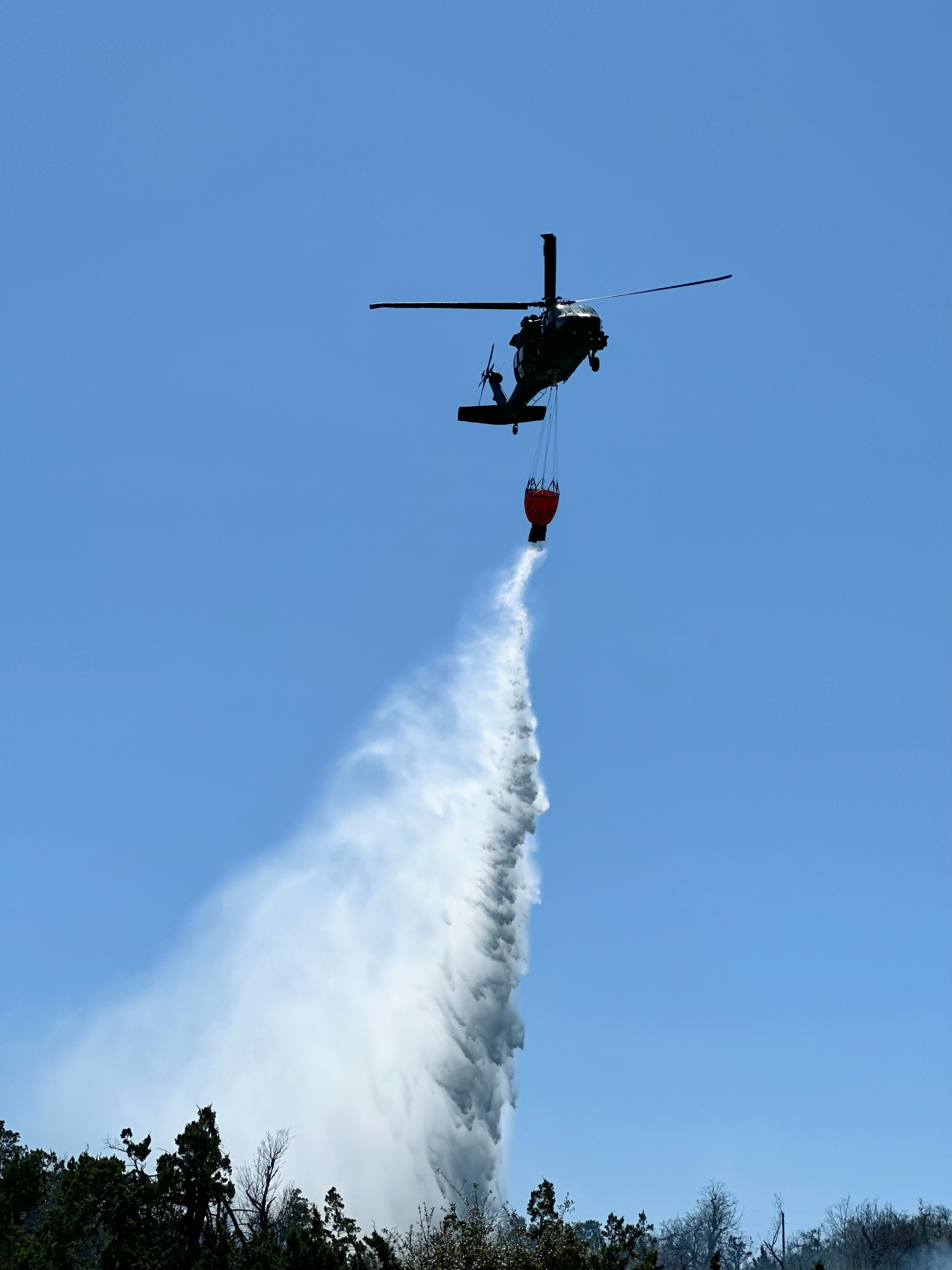 Helicopter Extinguishing Fire with Water Drop · Free Stock Photo