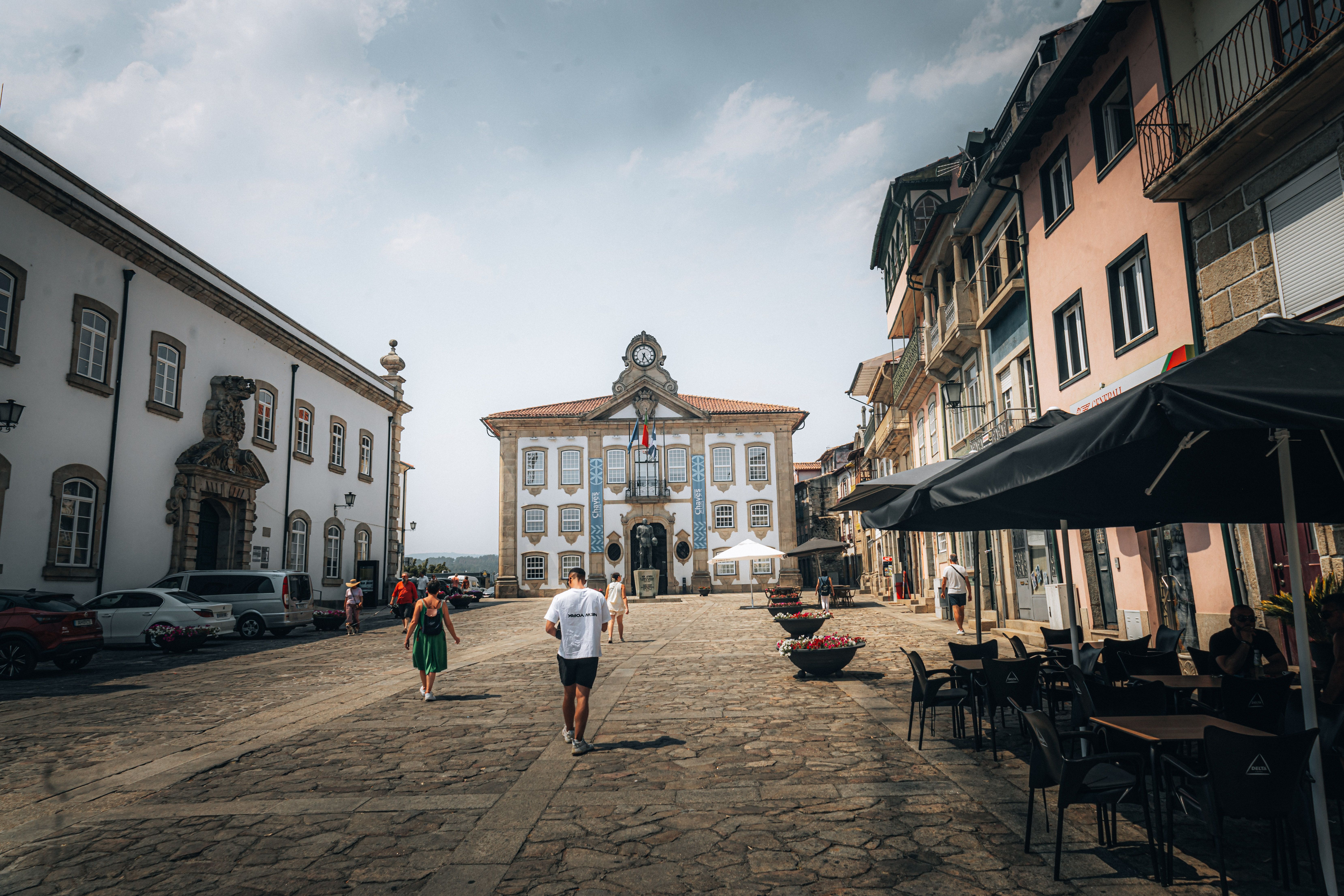 Historic European Town Square with Pedestrians · Free Stock Photo