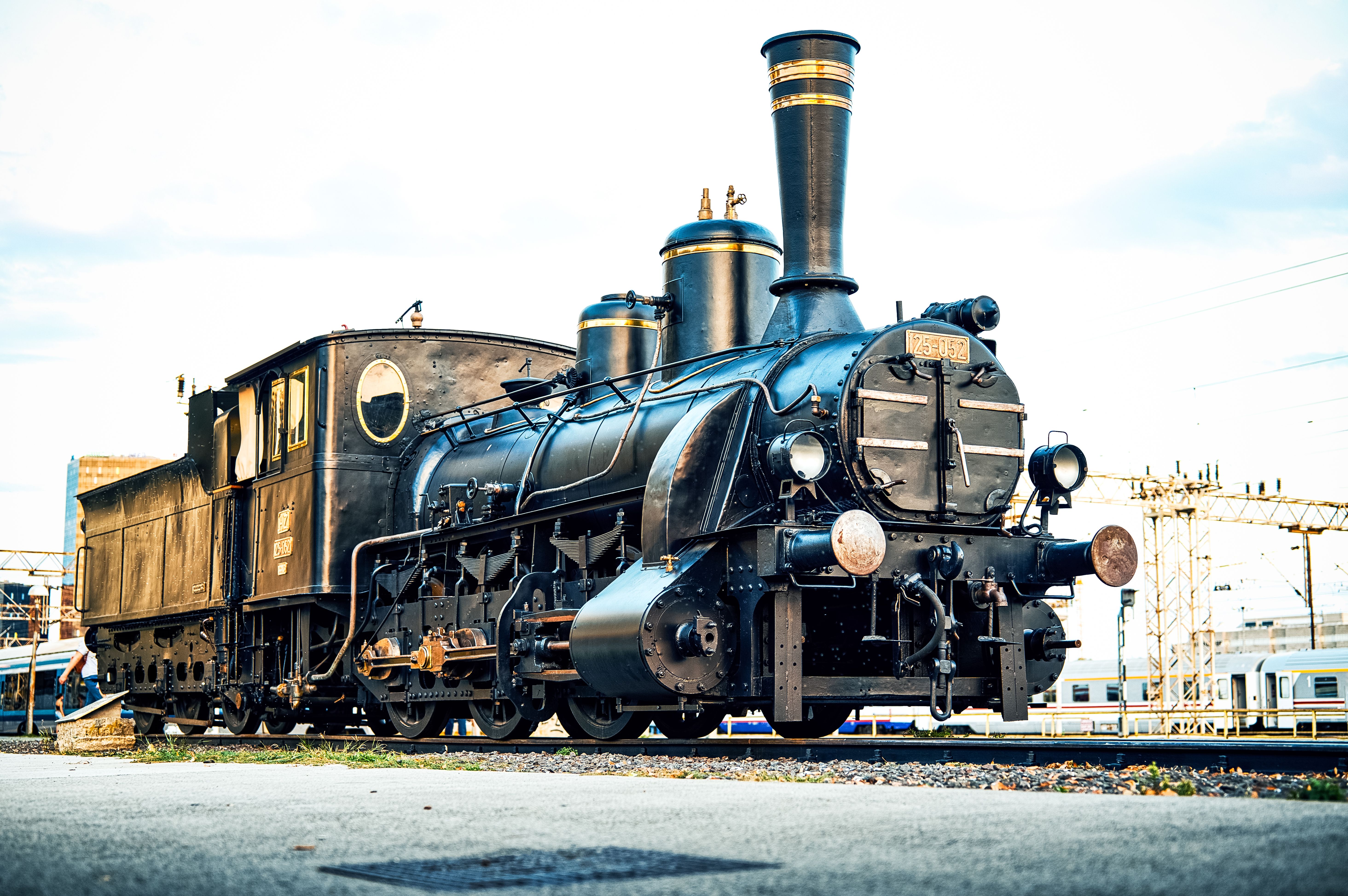 Vintage Steam Locomotive on Railway Track Outdoors · Free Stock Photo
