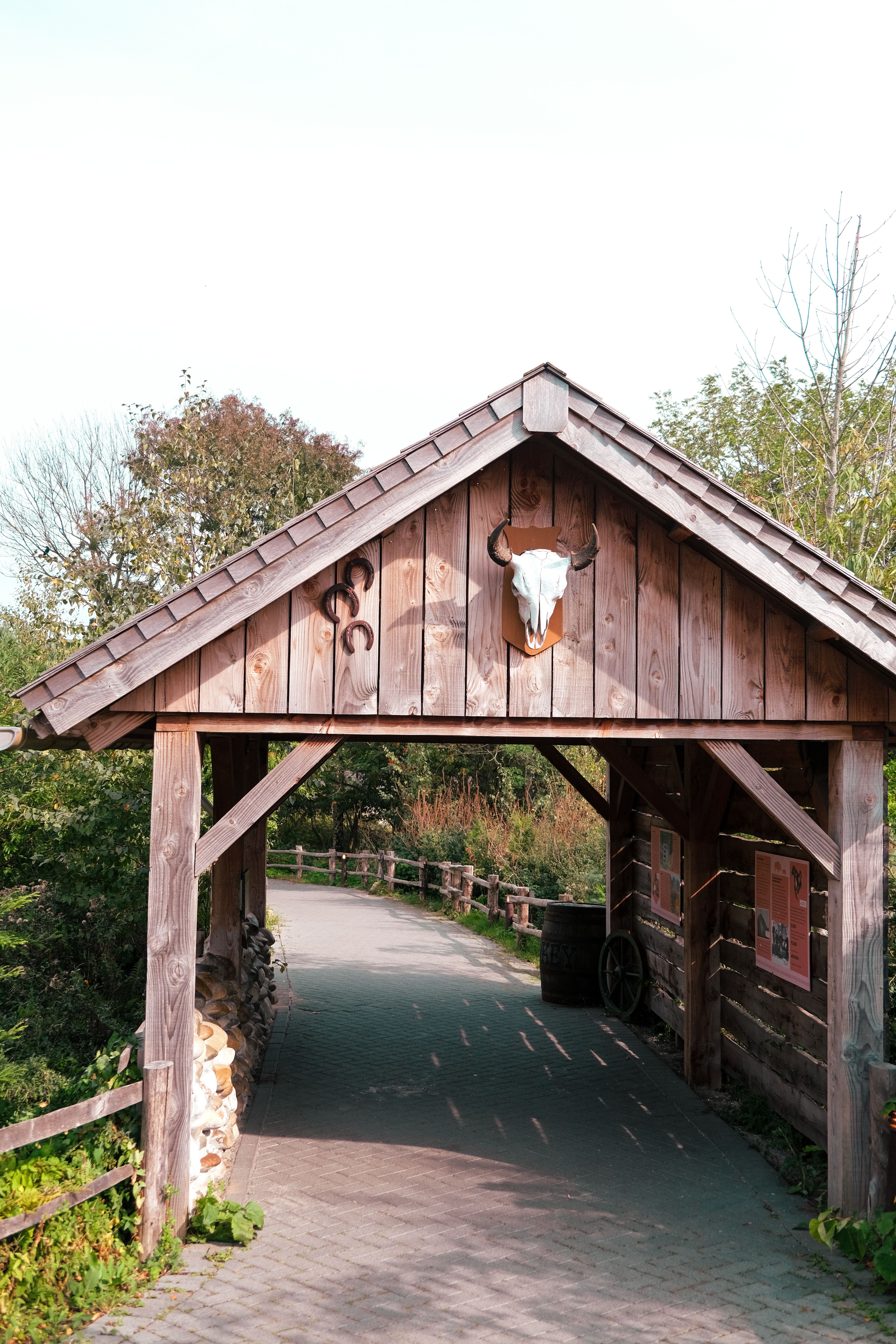 Rustic Wooden Gateway in Scenic Rural Pathway · Free Stock Photo