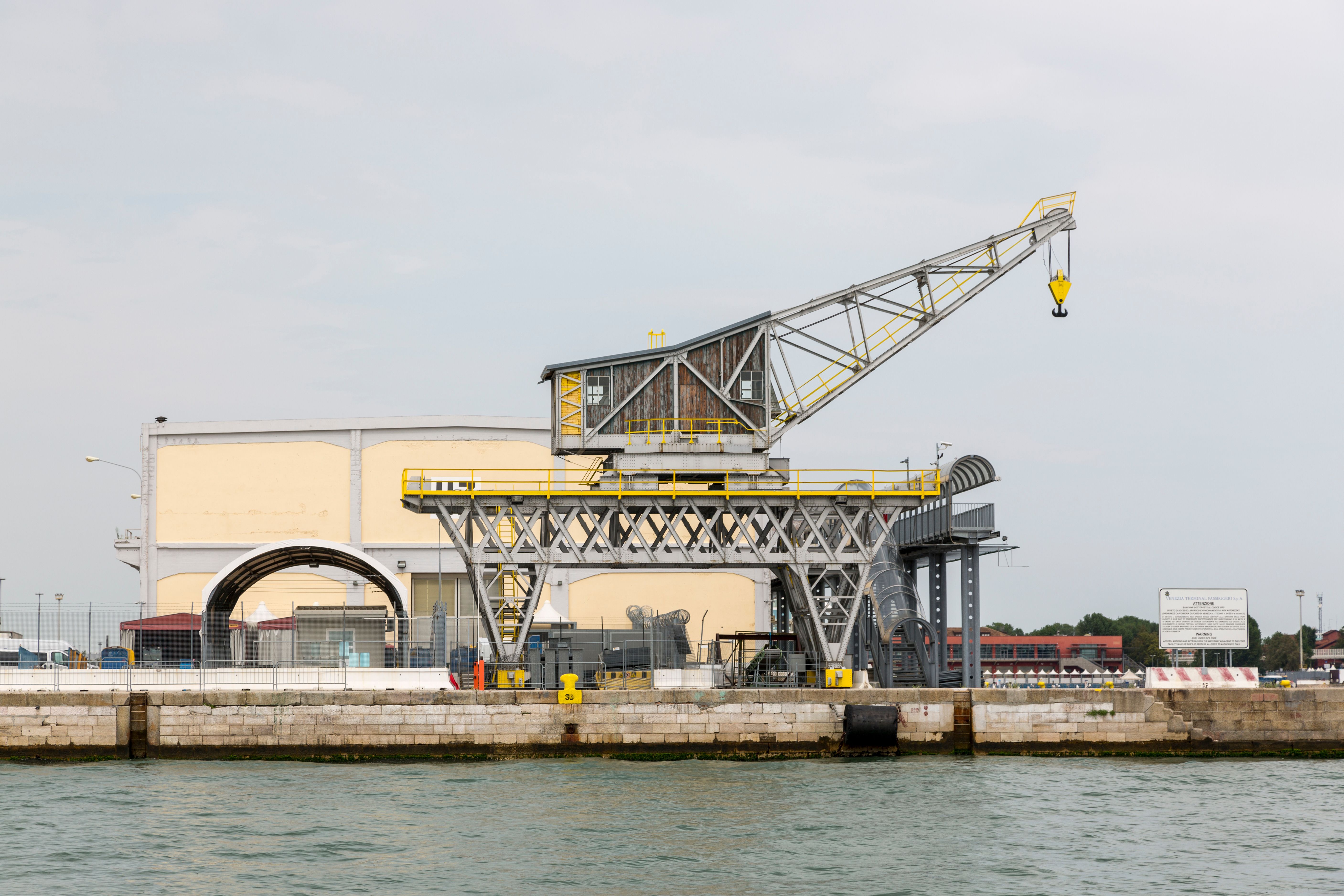 Industrial Harbor Crane in Coastal Port Scene · Free Stock Photo