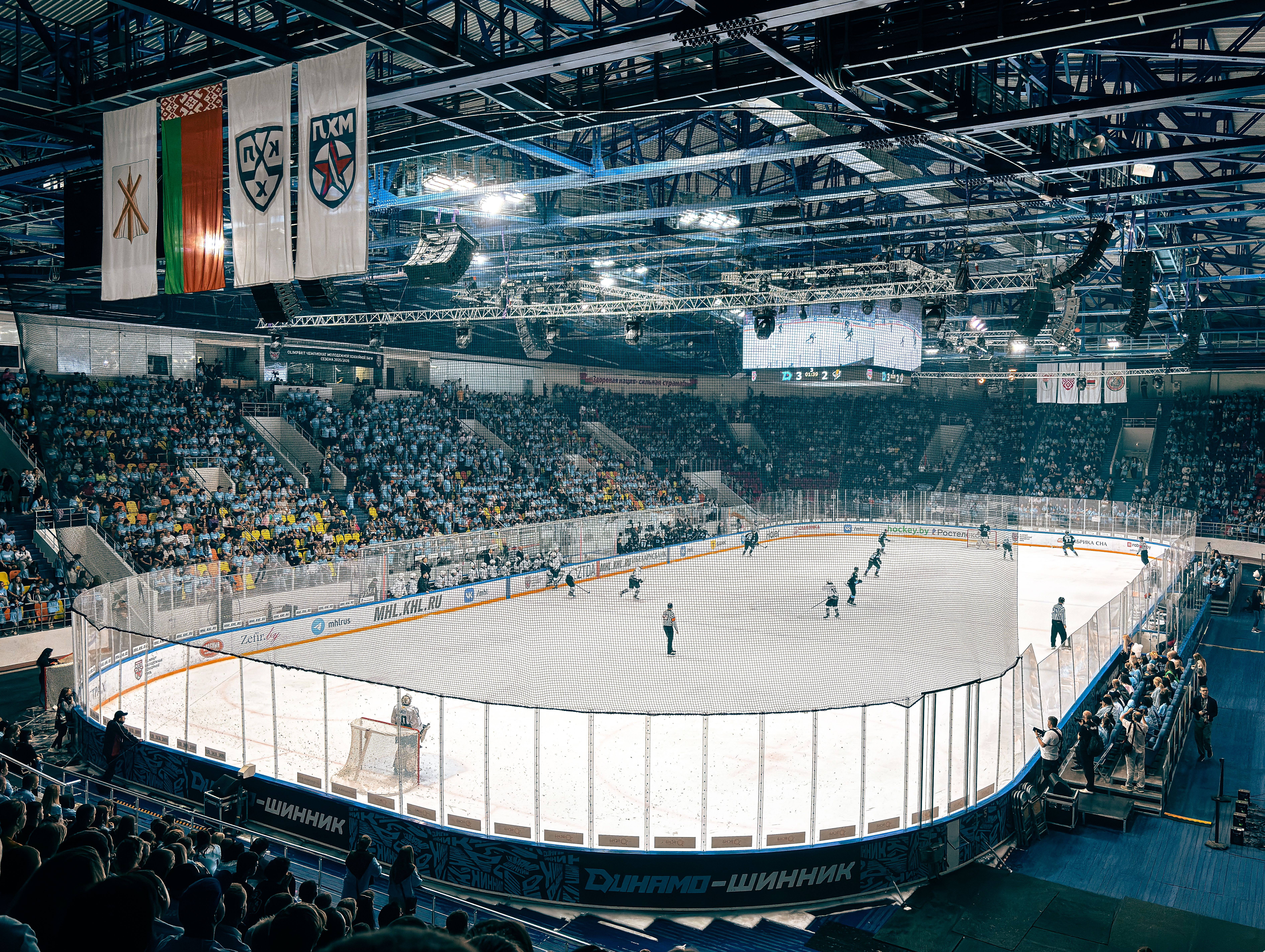 Dynamic Ice Hockey Match in Indoor Arena · Free Stock Photo