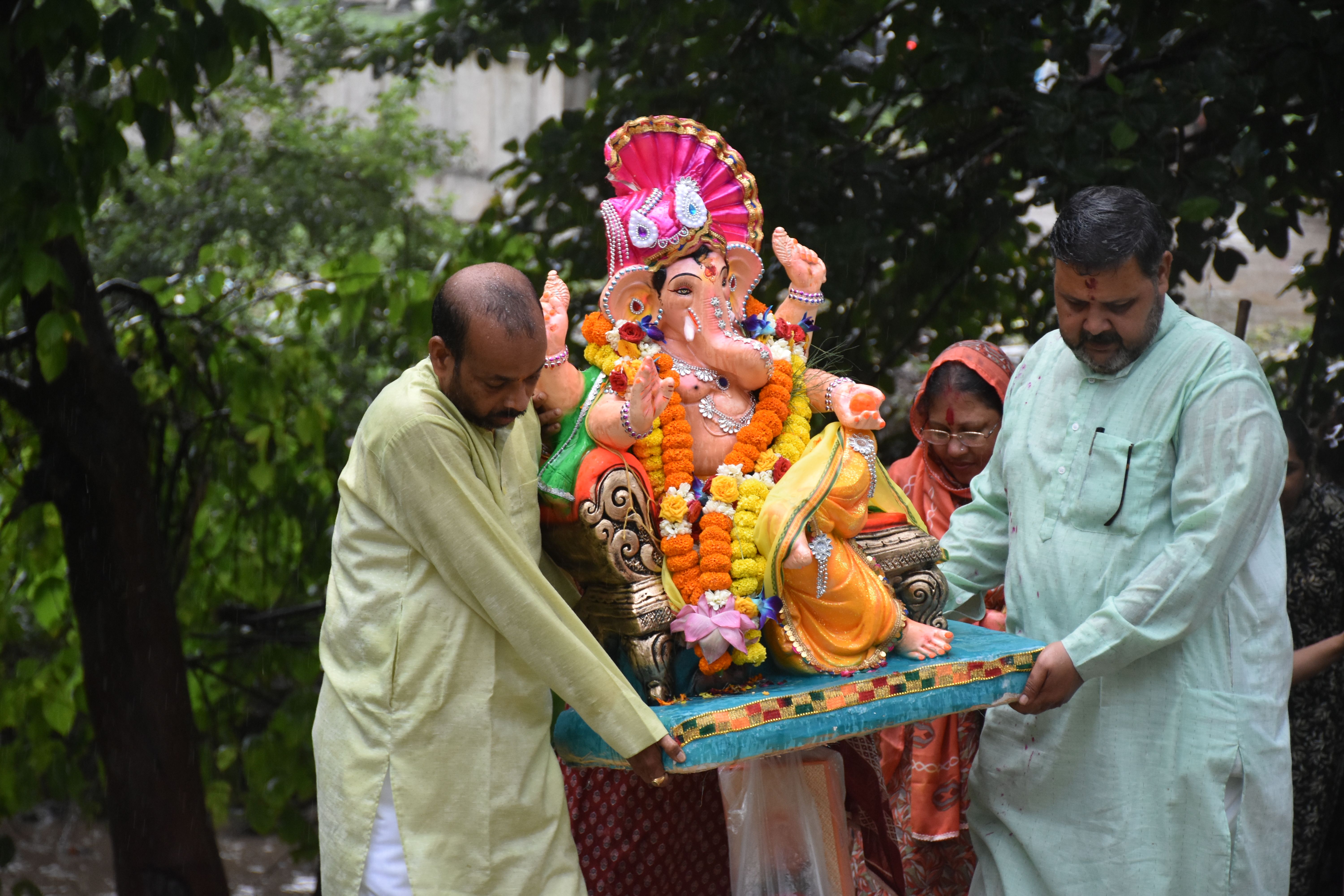 Devotees Carrying Ganesh Idol During Festival · Free Stock Photo