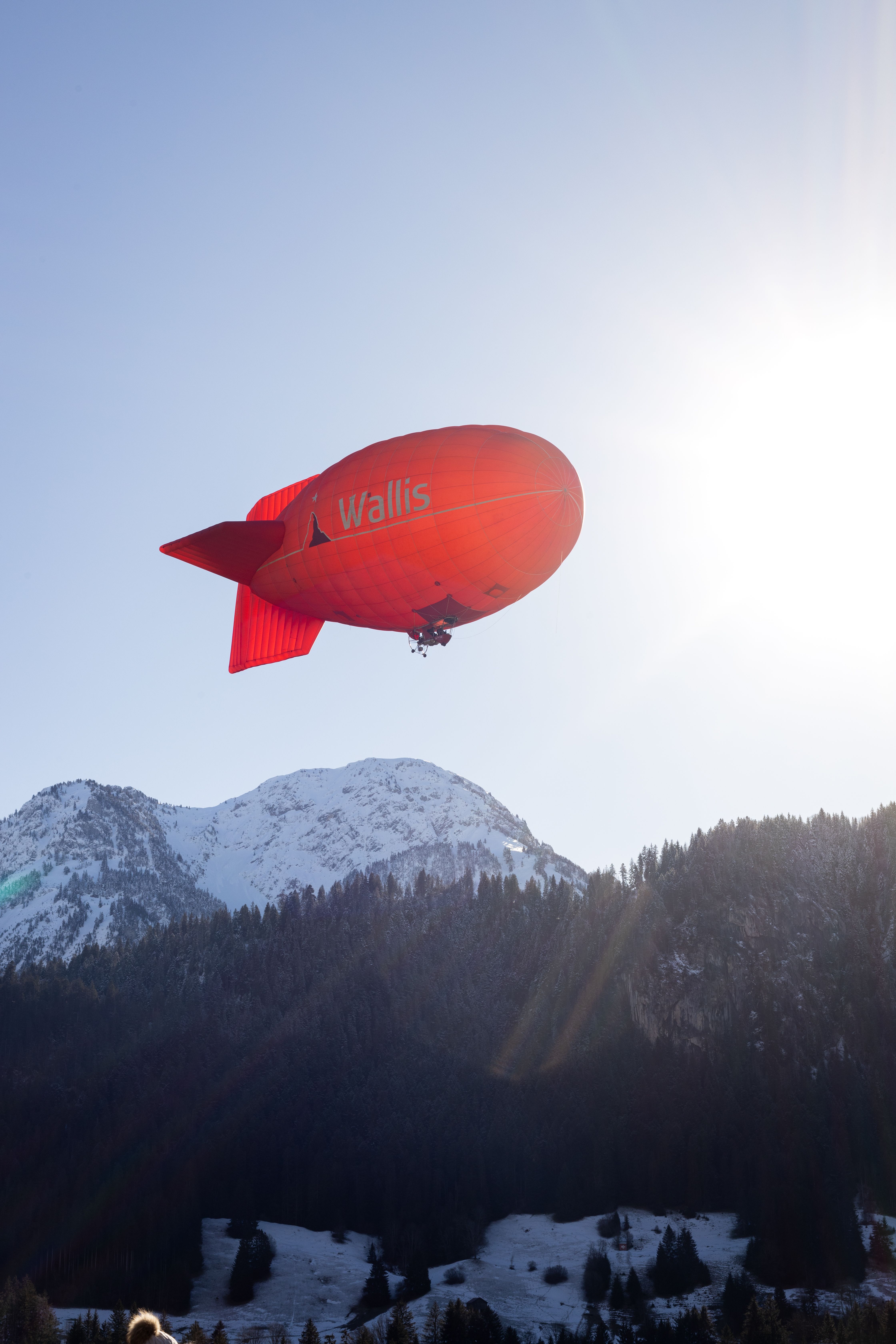 Red Airship Over Snowy Swiss Alps in Château-d'Oex · Free Stock Photo