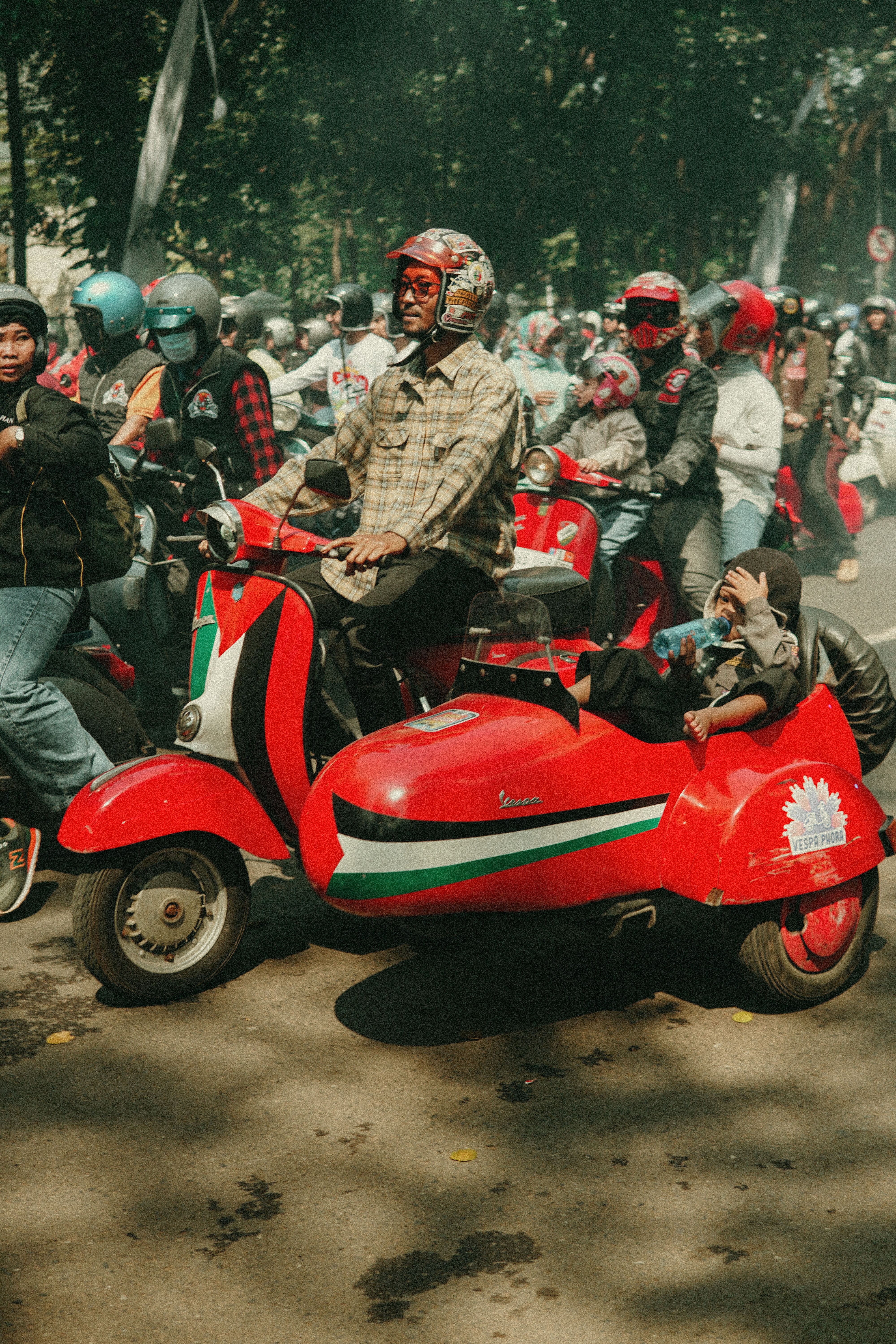 Colorful Scooter Parade in Bandung Celebrates Culture · Free Stock Photo