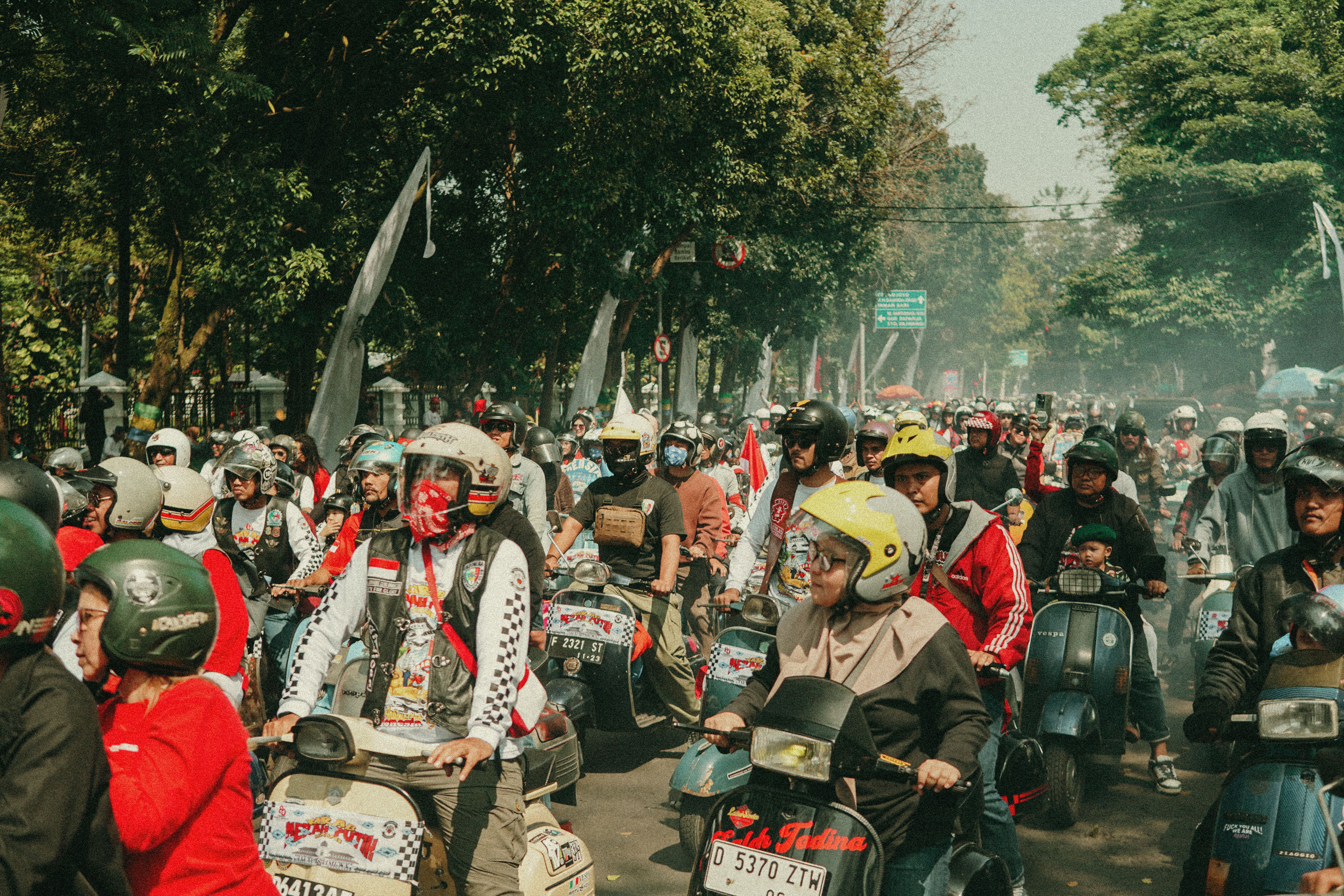 Vibrant Scooter Parade Celebrating Culture in Bandung · Free Stock Photo