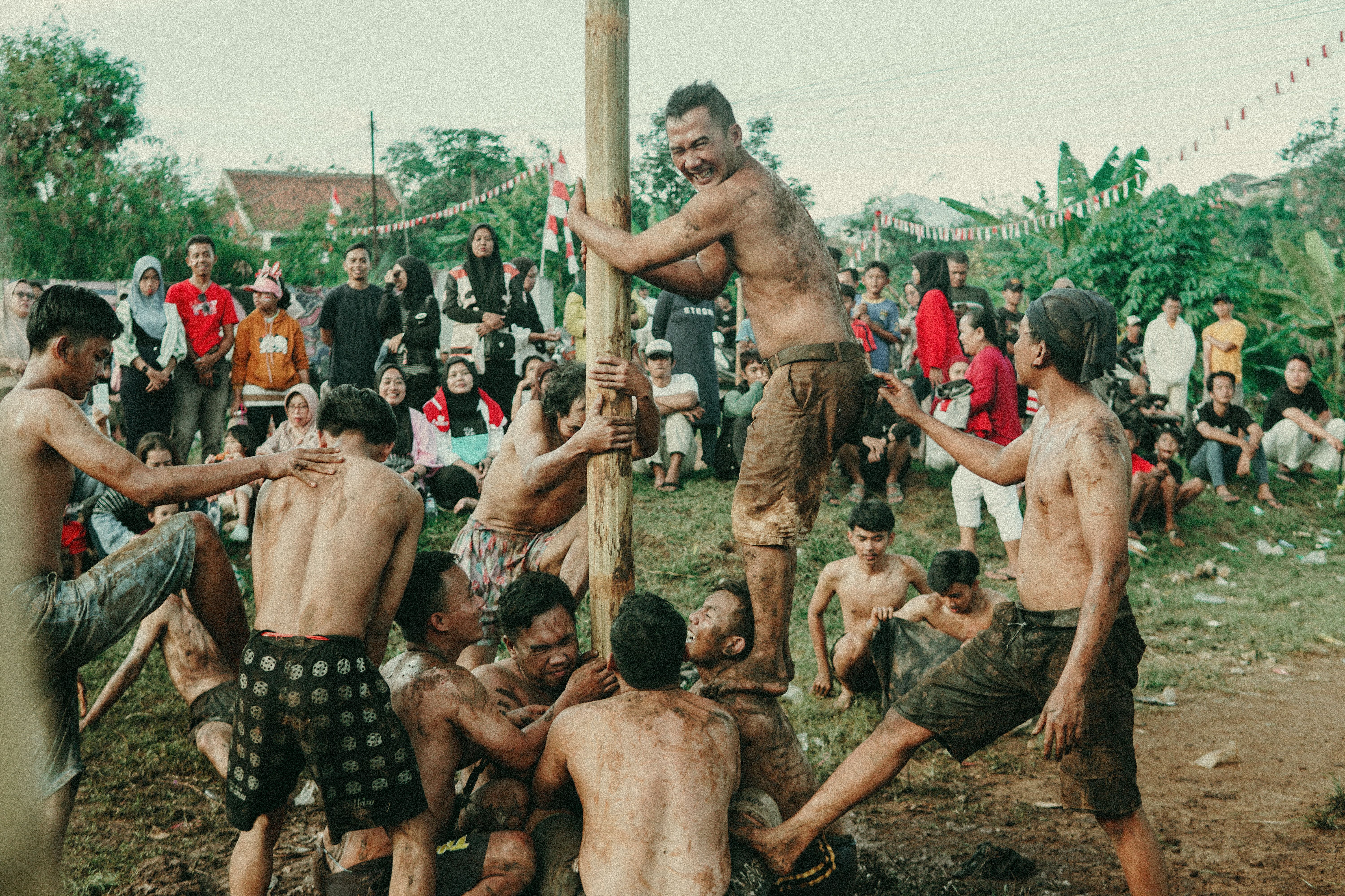 Traditional Indonesian Panjat Pinang Game in Festival · Free Stock Photo