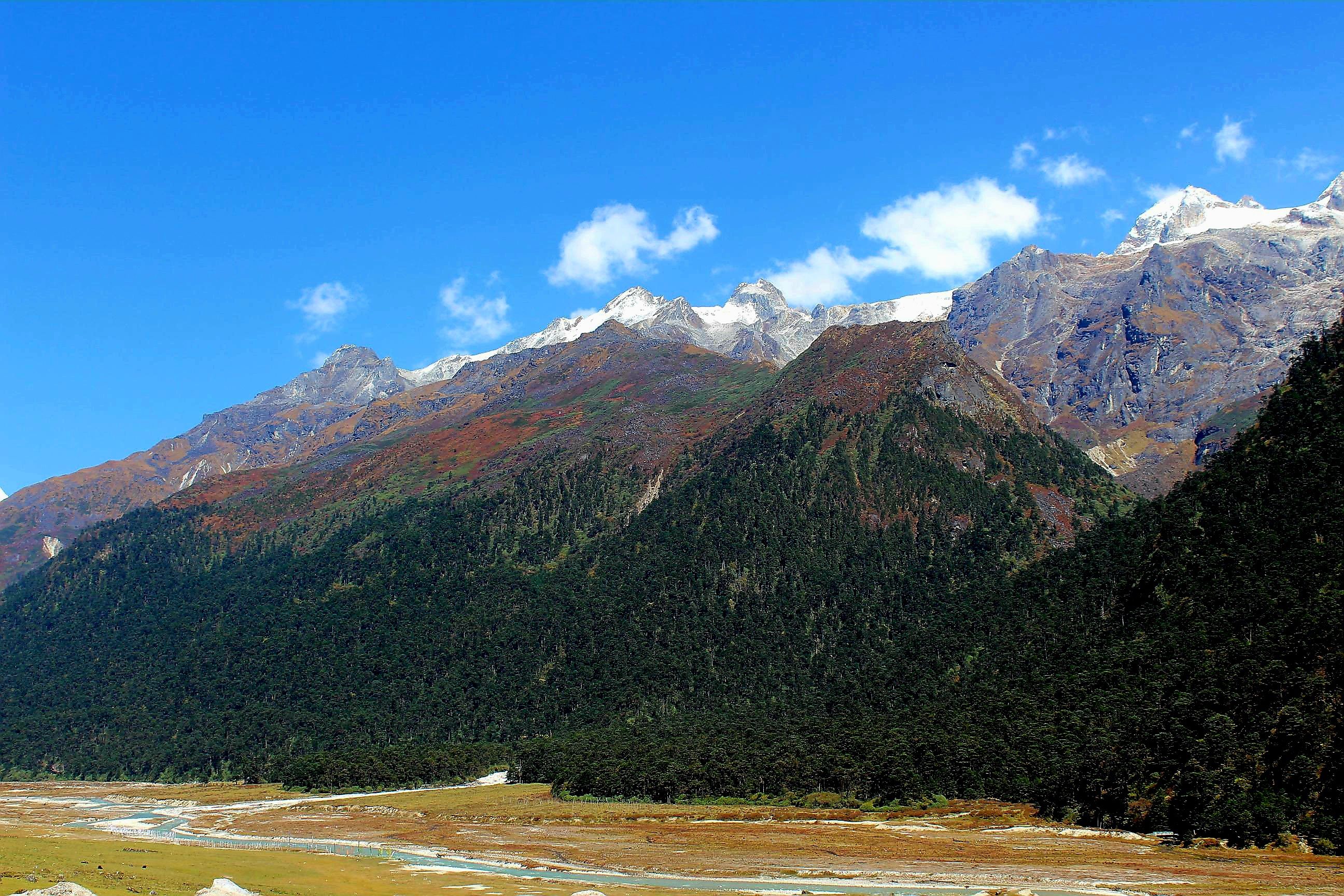 Majestic Himalayan Mountains Under Bright Blue Sky · Free Stock Photo