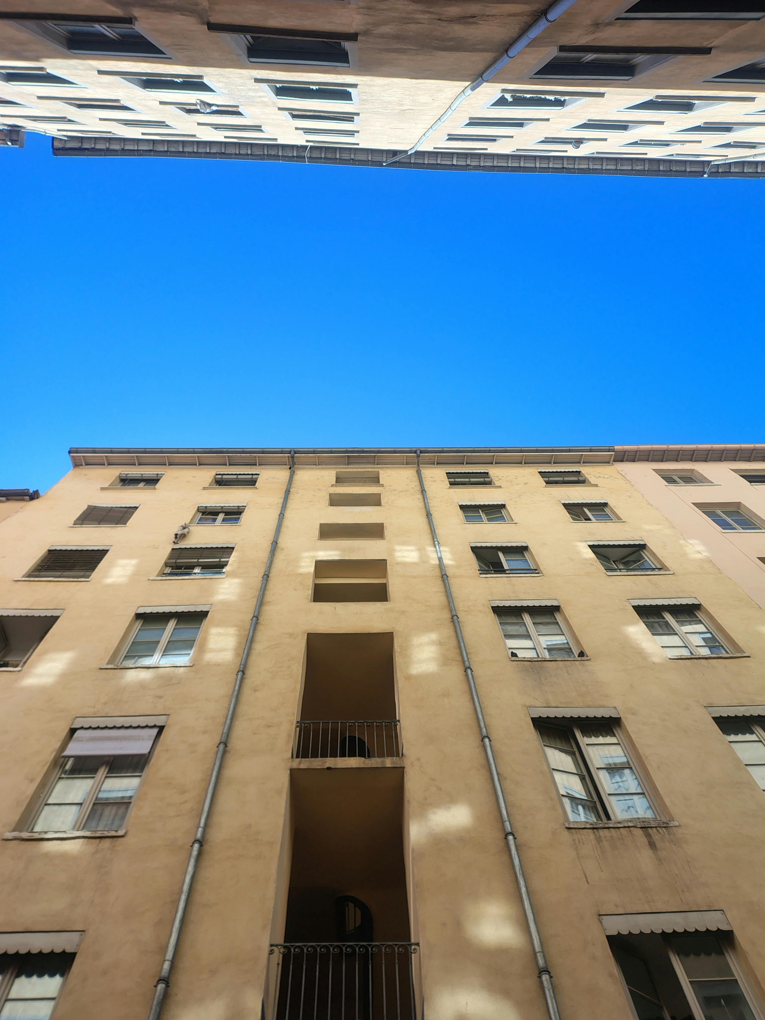 Upward View of Urban Apartment Buildings · Free Stock Photo