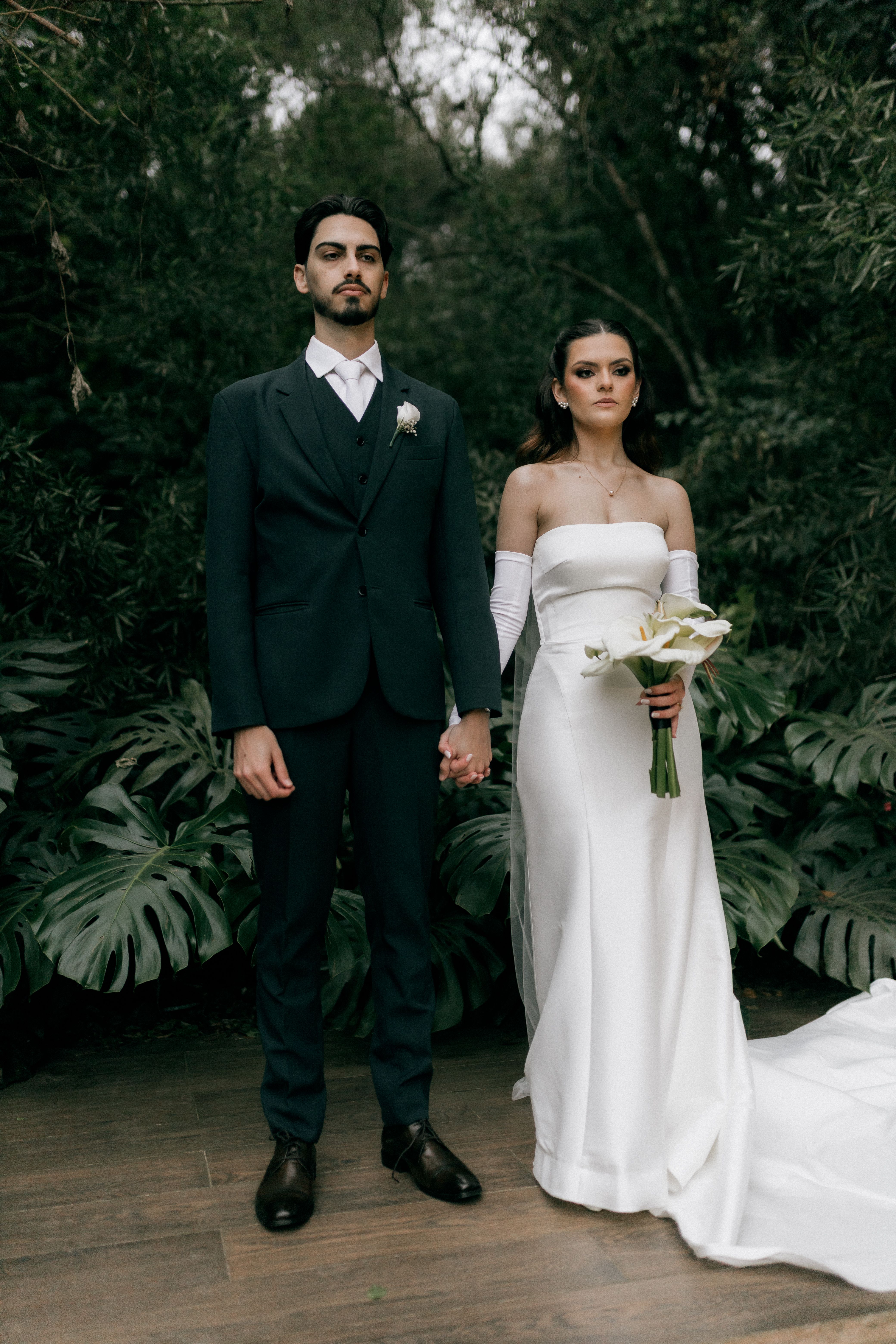 Elegant Outdoor Wedding Portrait in Lush Greenery · Free Stock Photo