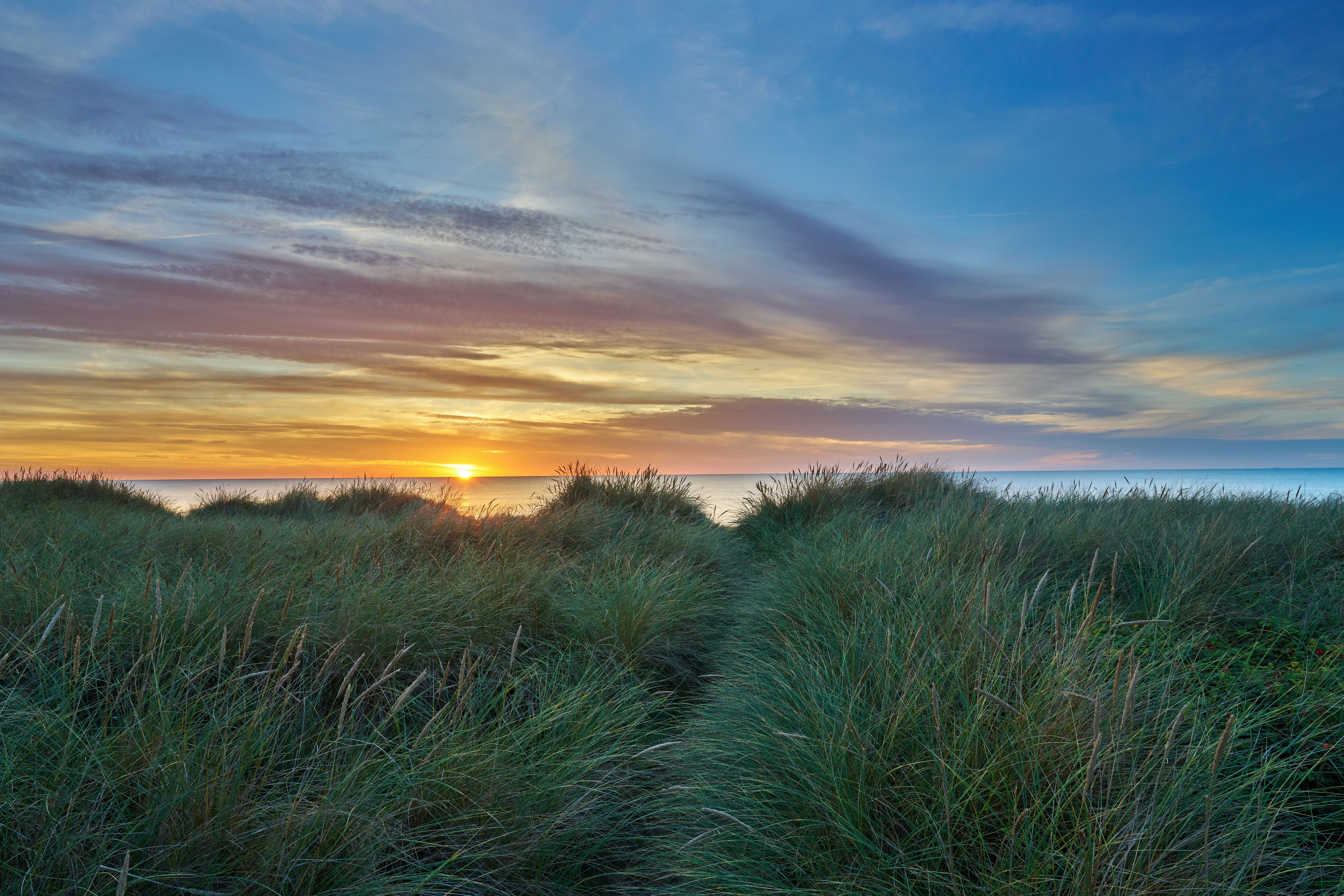 Serene Sunset Over Hjørring Dunes in Denmark · Free Stock Photo