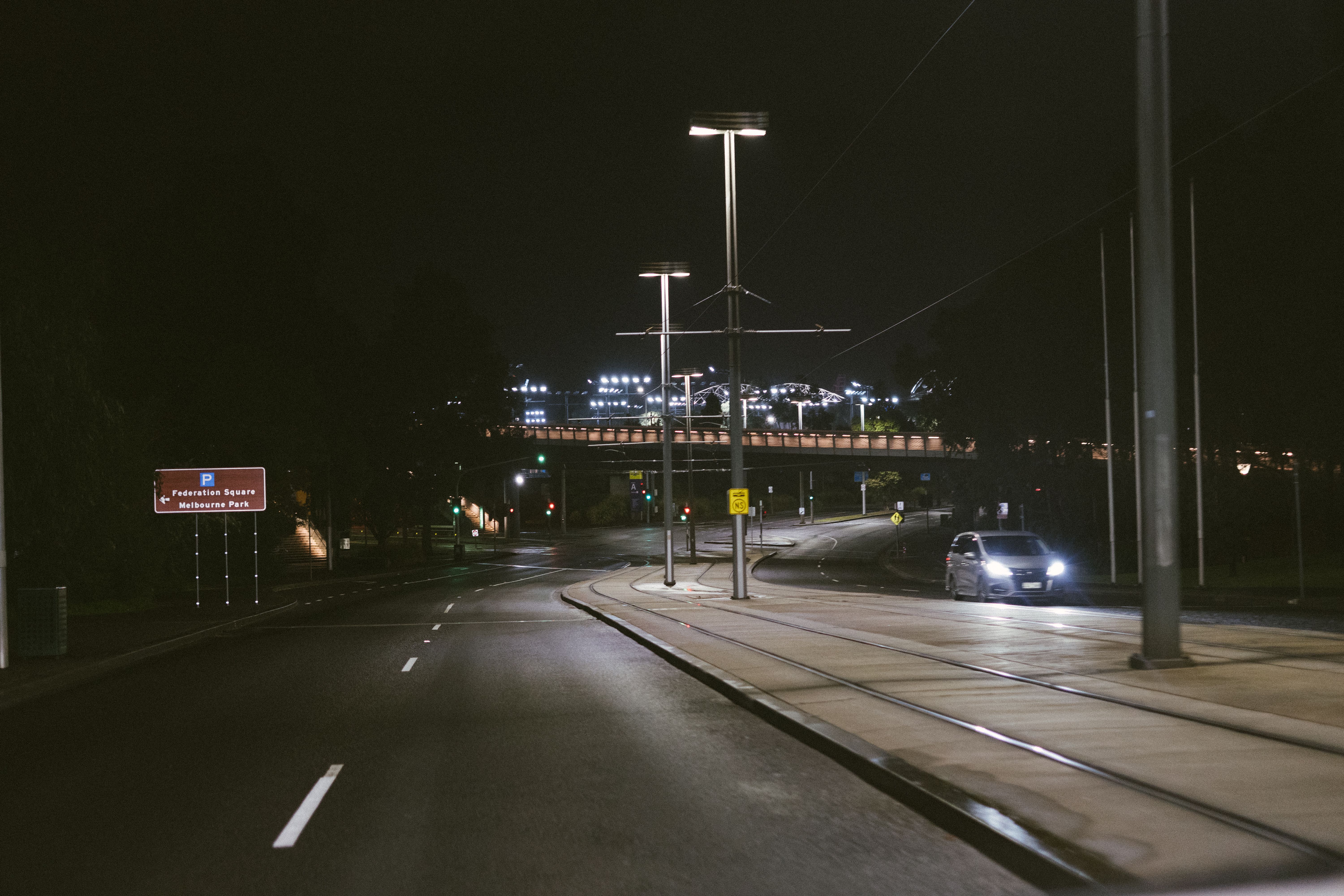 Melbourne City Night Road Scene with Car · Free Stock Photo