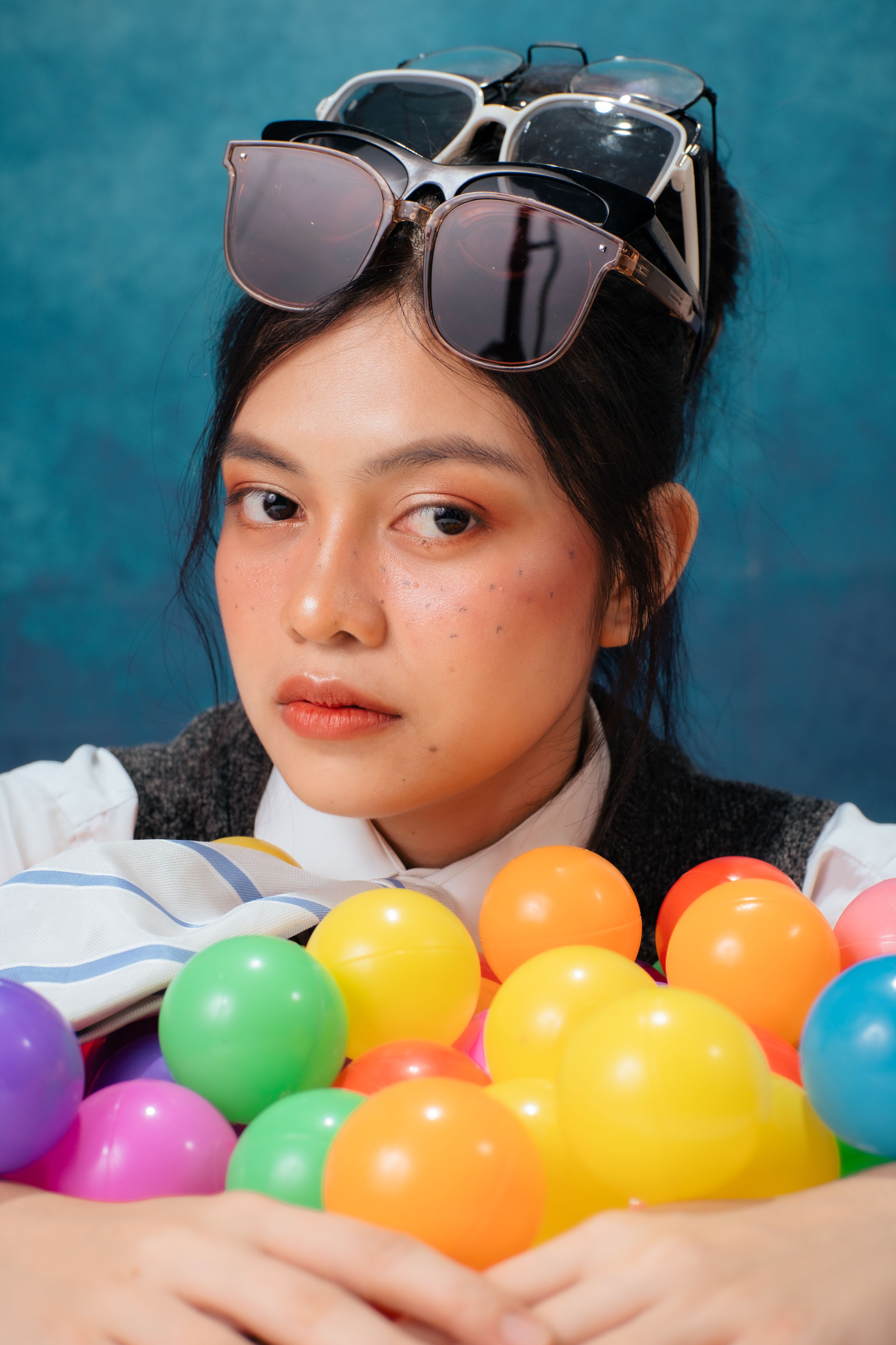 Colorful Portrait of Woman with Sunglasses and Balls · Free Stock Photo