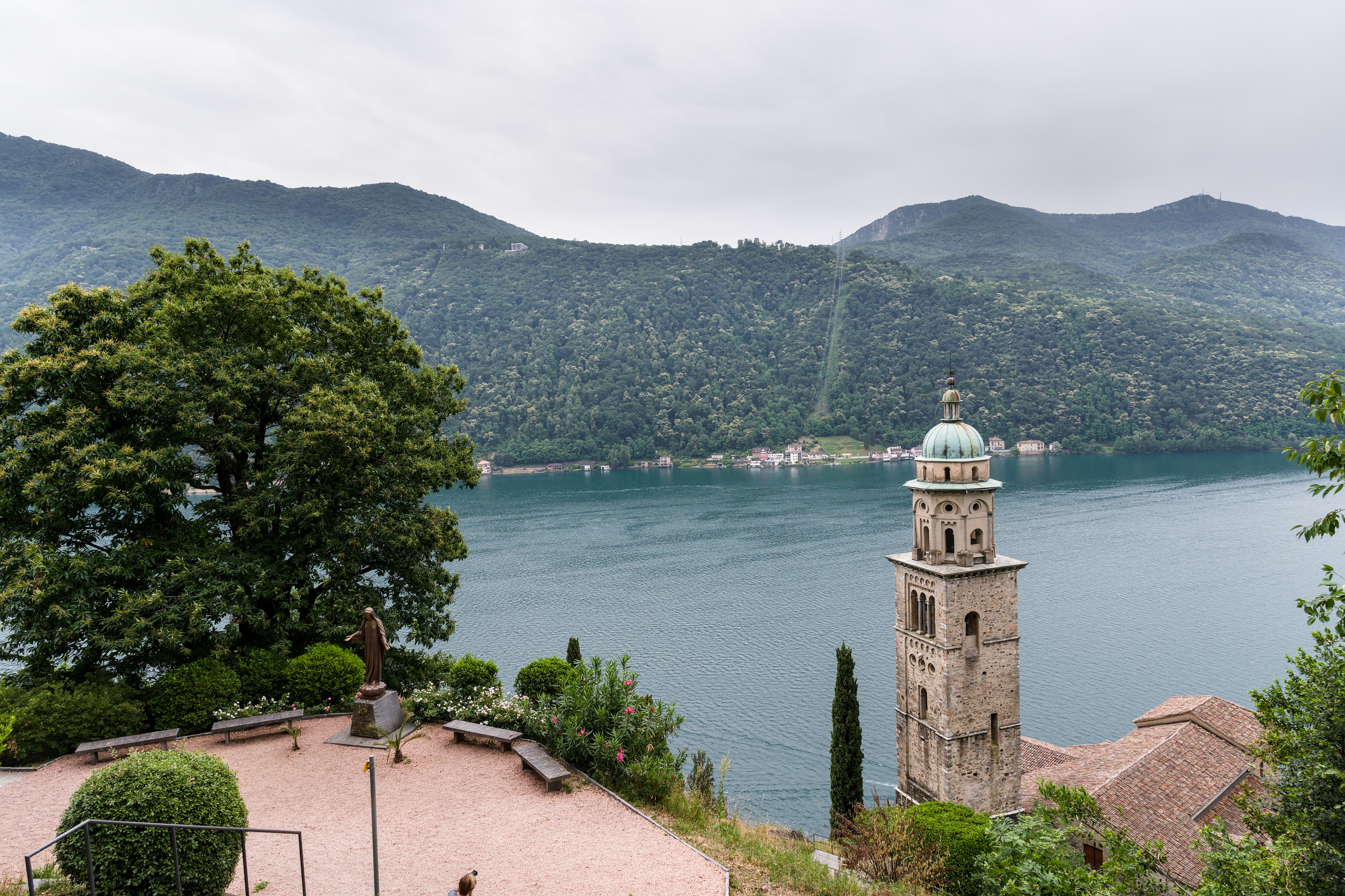 Scenic View of Lake Lugano with Historic Bell Tower · Free Stock Photo