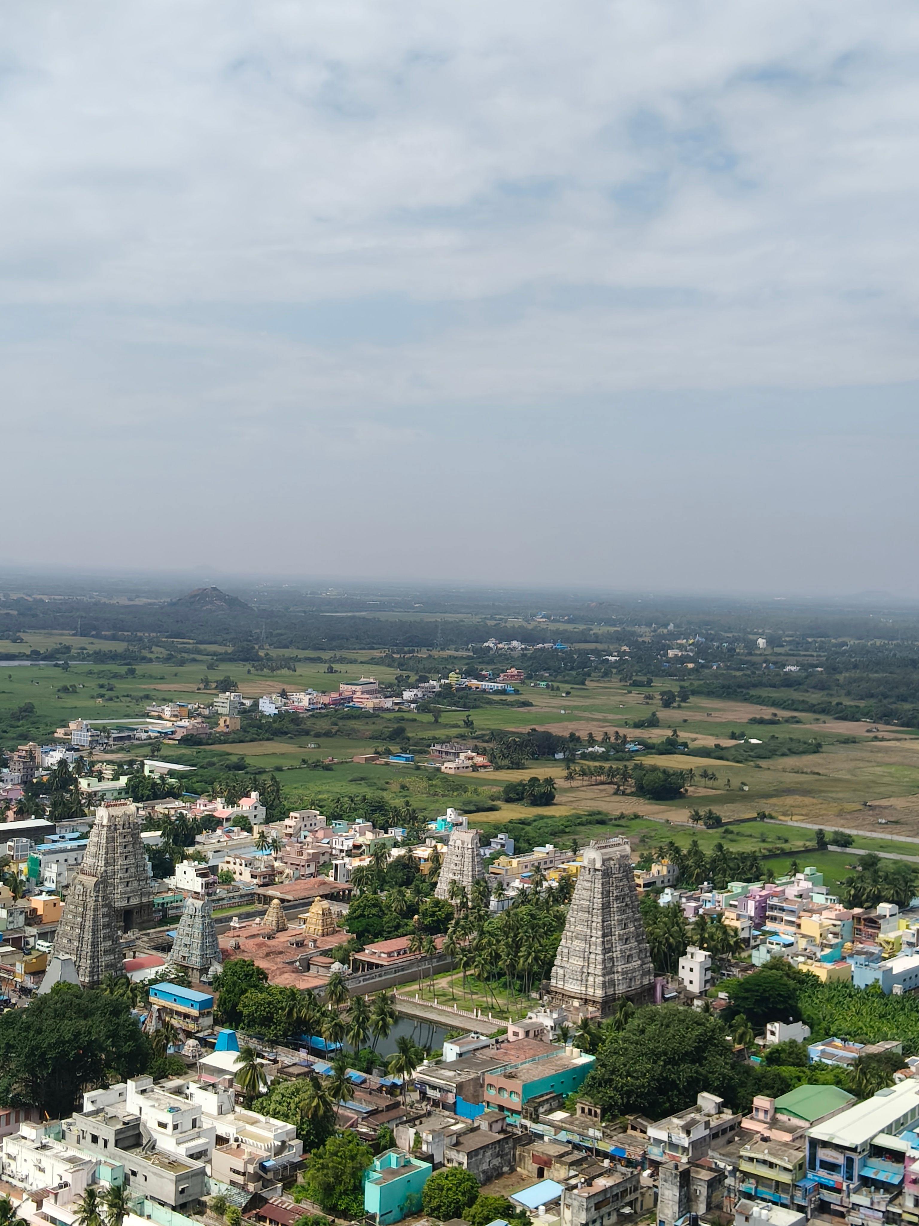 Free High-angle shot of Indian cityscape featuring gopuram towers in a ...
