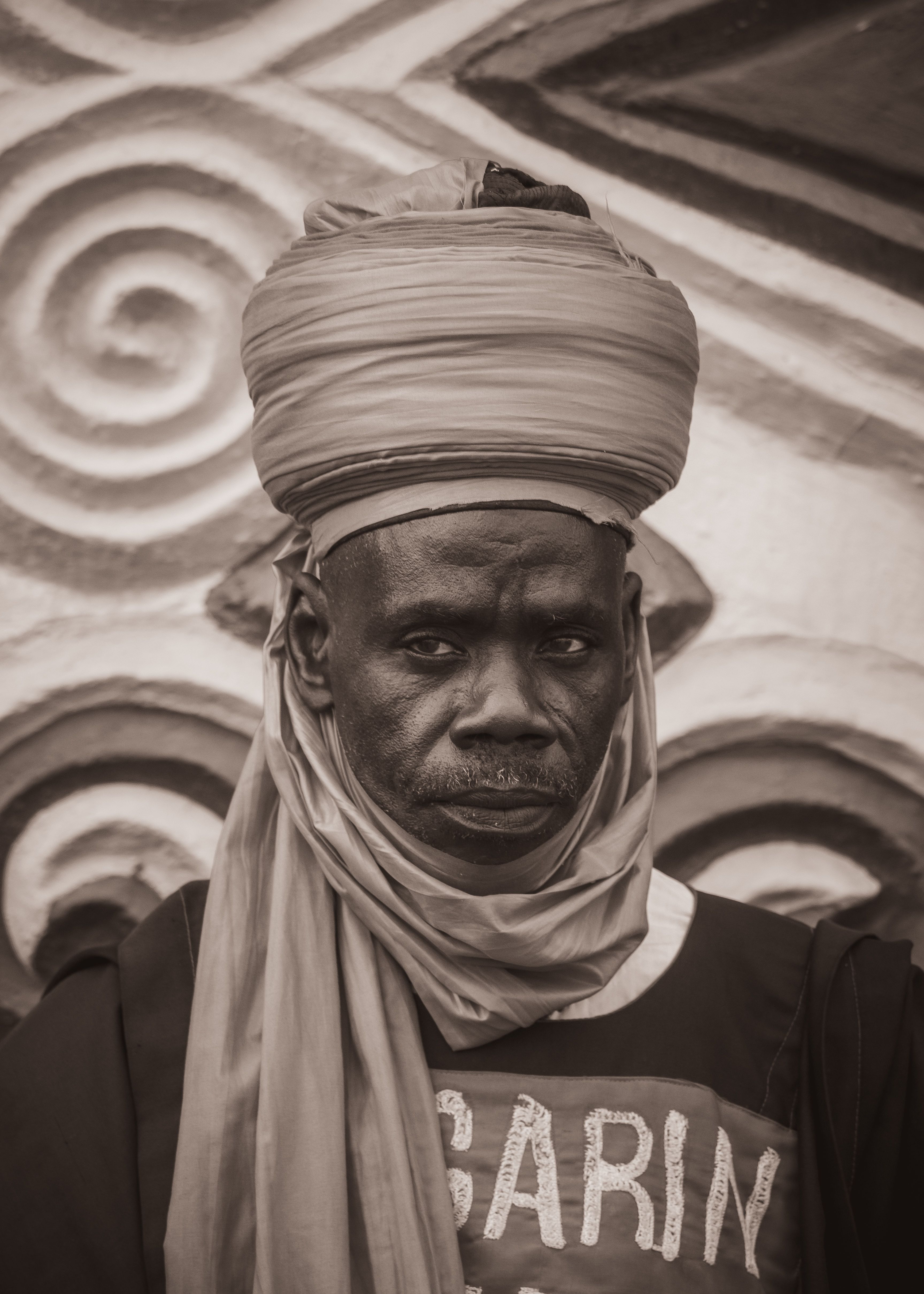 Traditional African Attire Portrait in Sepia · Free Stock Photo