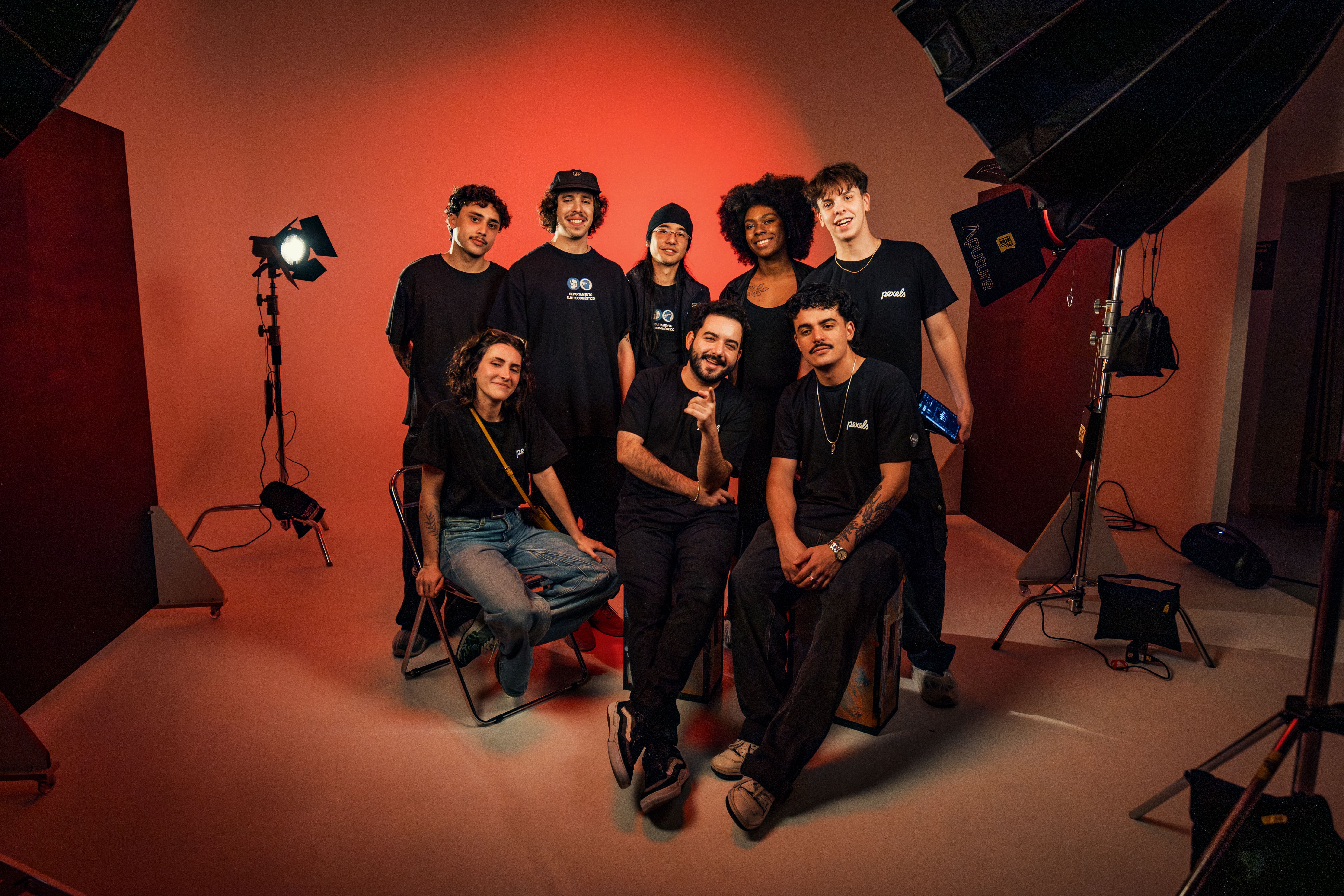 Diverse Creative Team Posing in Studio Setting · Free Stock Photo