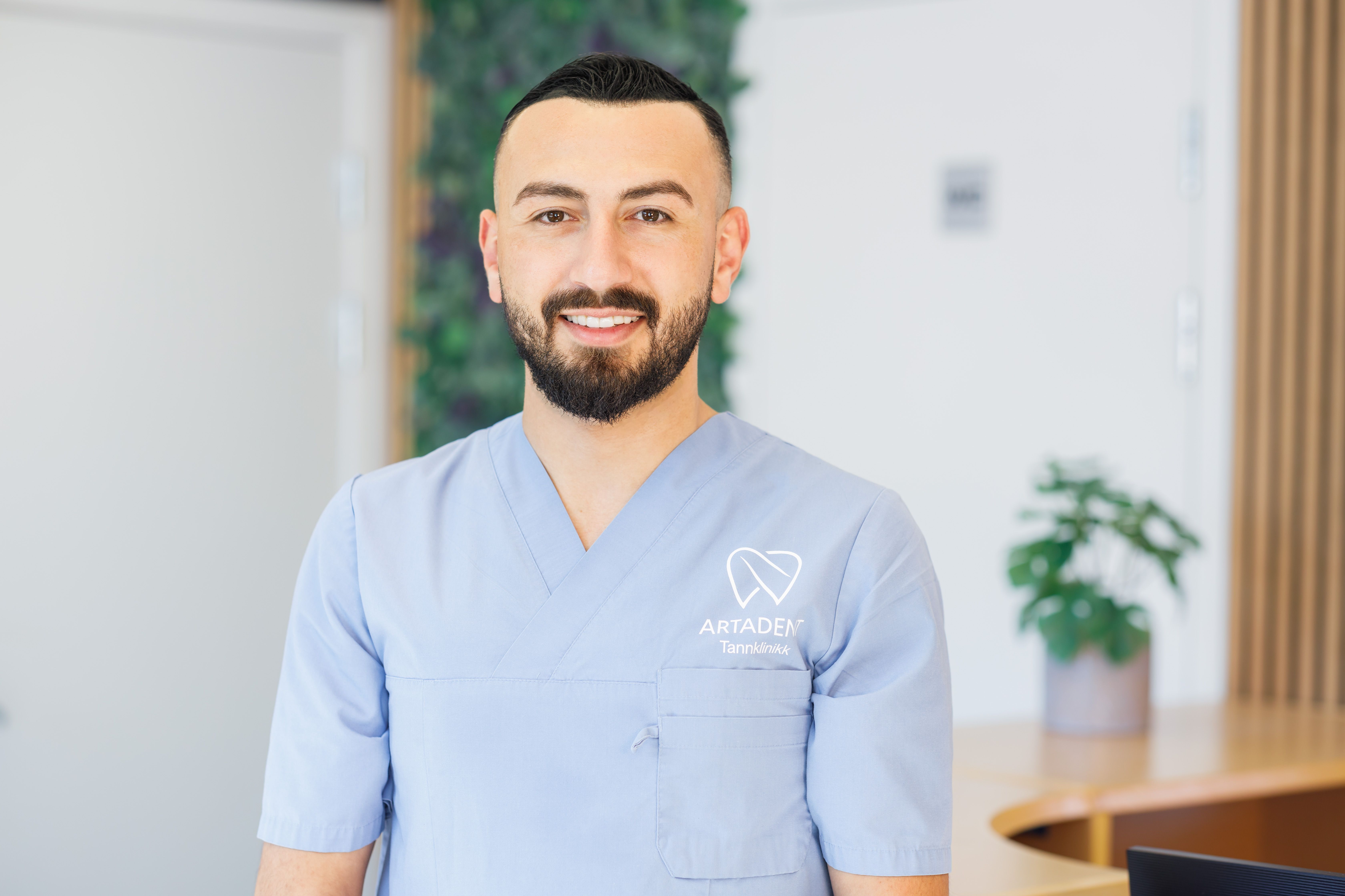 Smiling Dentist in Modern Dental Office · Free Stock Photo