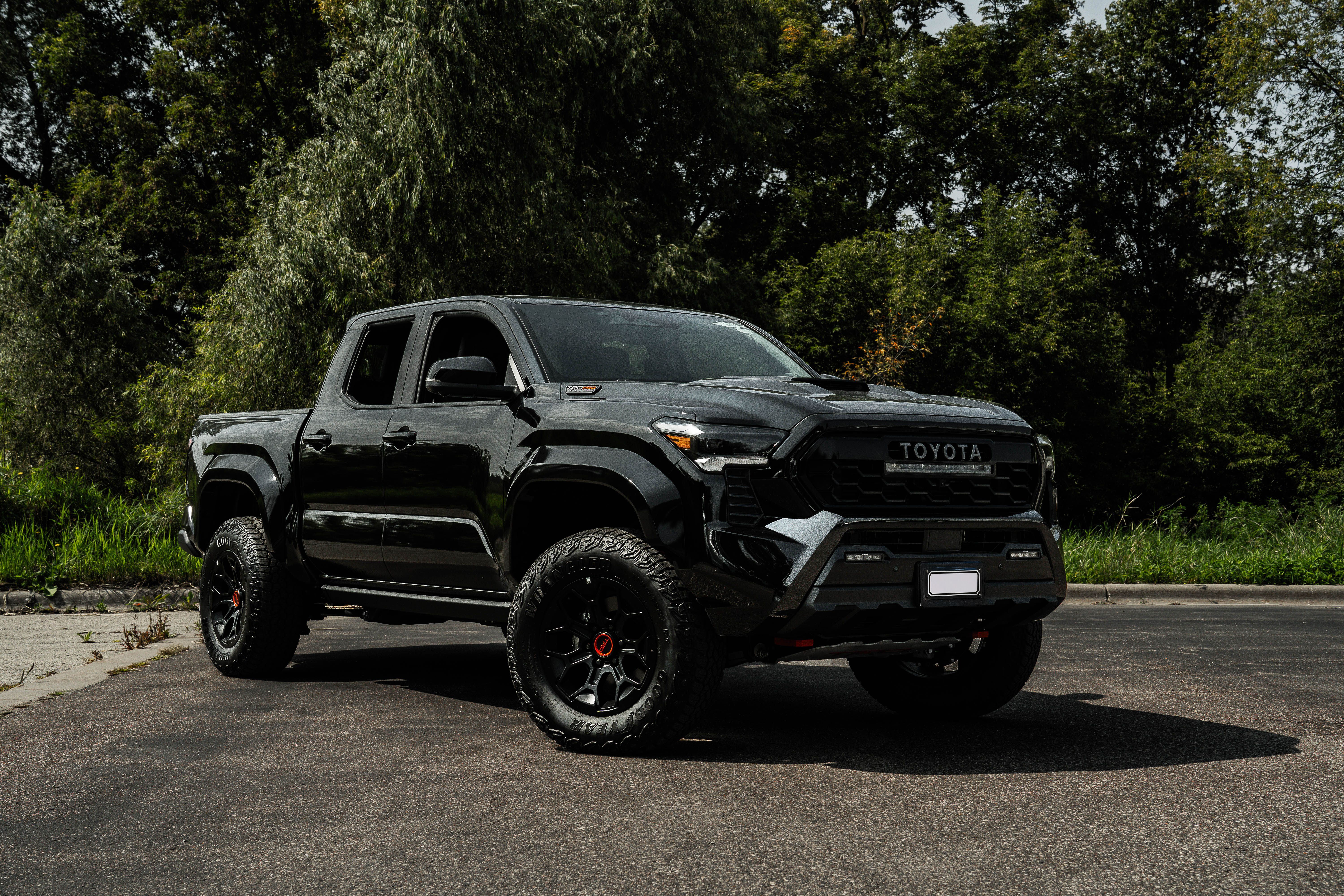 Sleek Black Pickup Truck in Outdoor Setting · Free Stock Photo