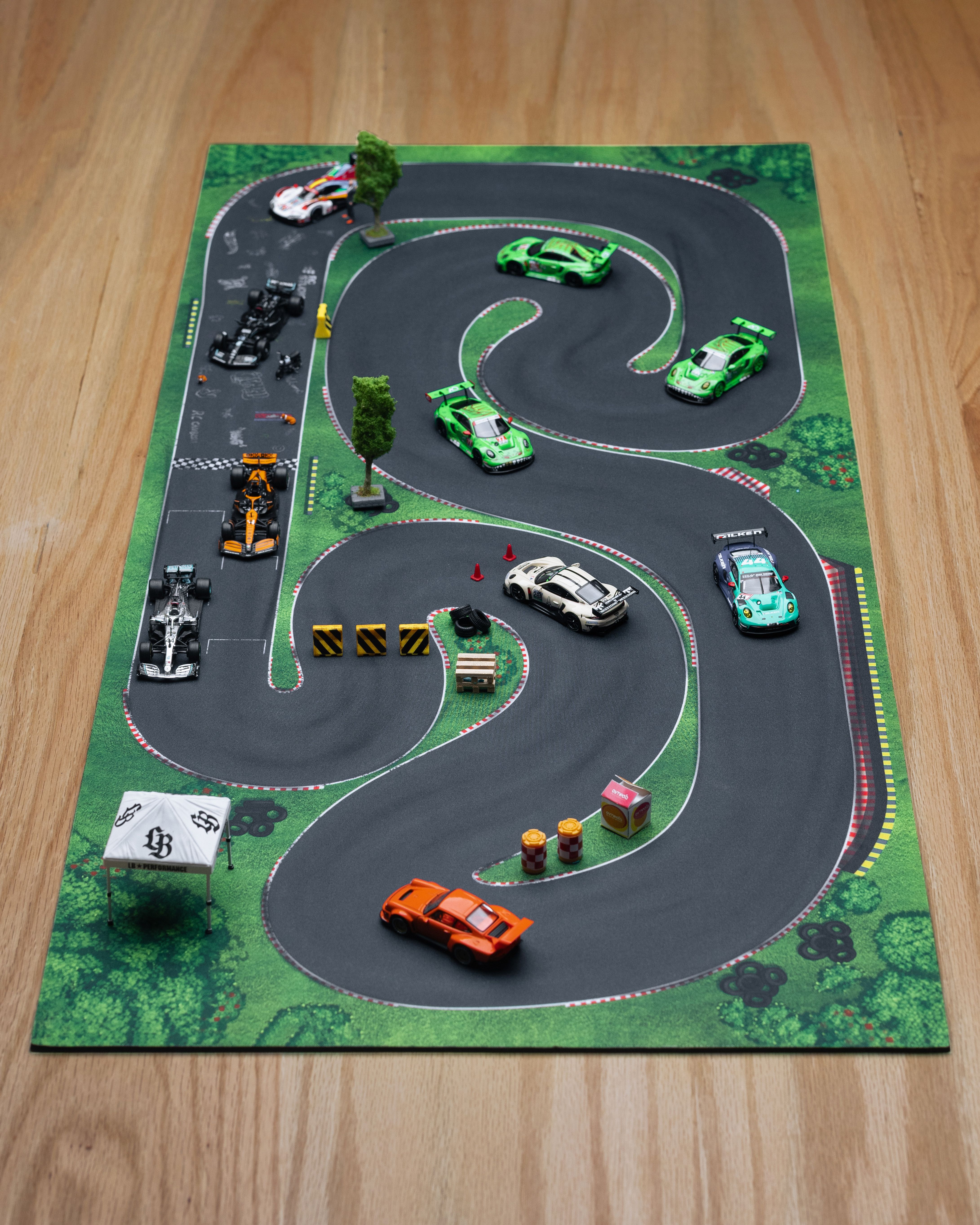 Miniature Racing Track with Diecast Cars · Free Stock Photo