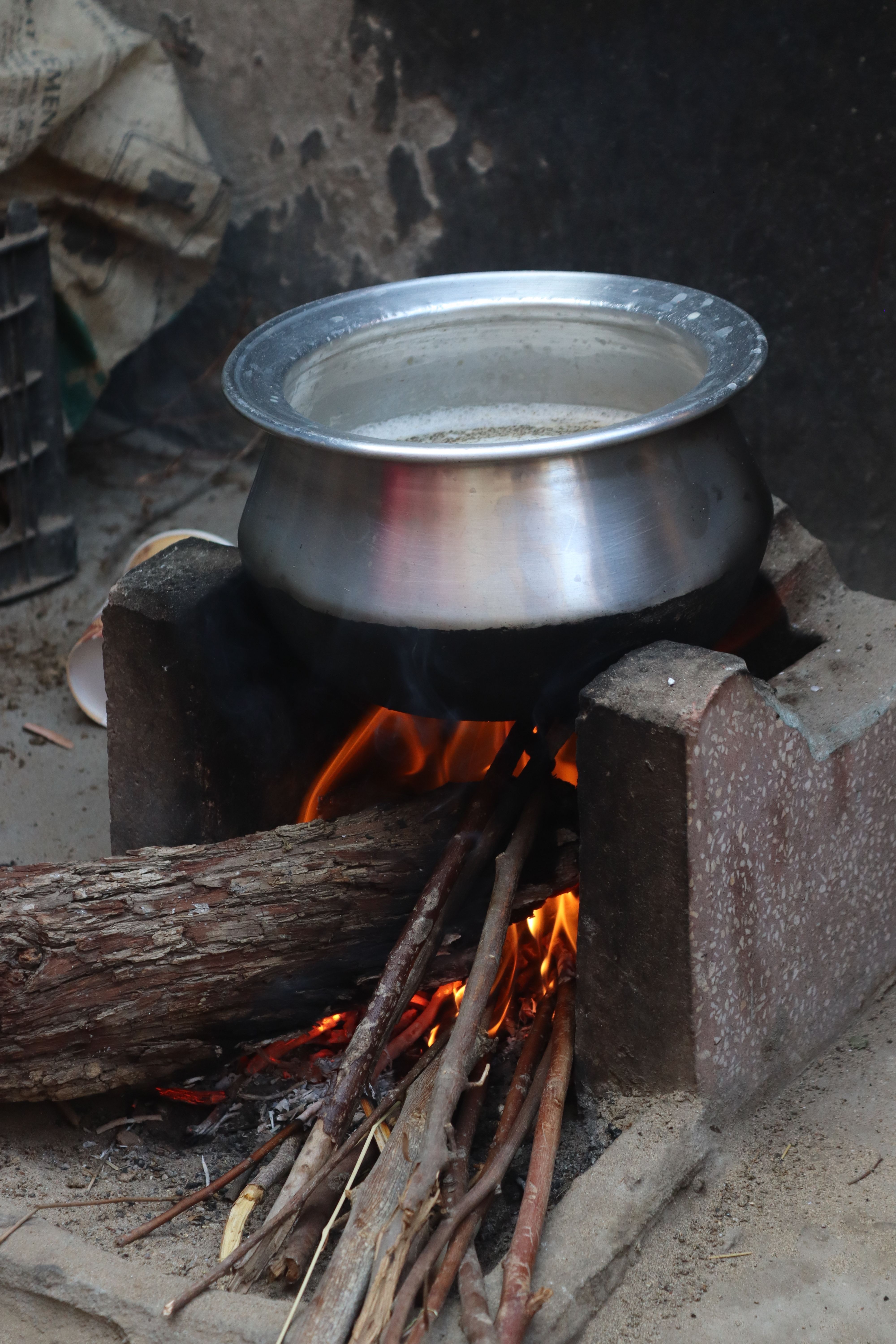 Traditional Cooking with Fire and Metal Pot · Free Stock Photo