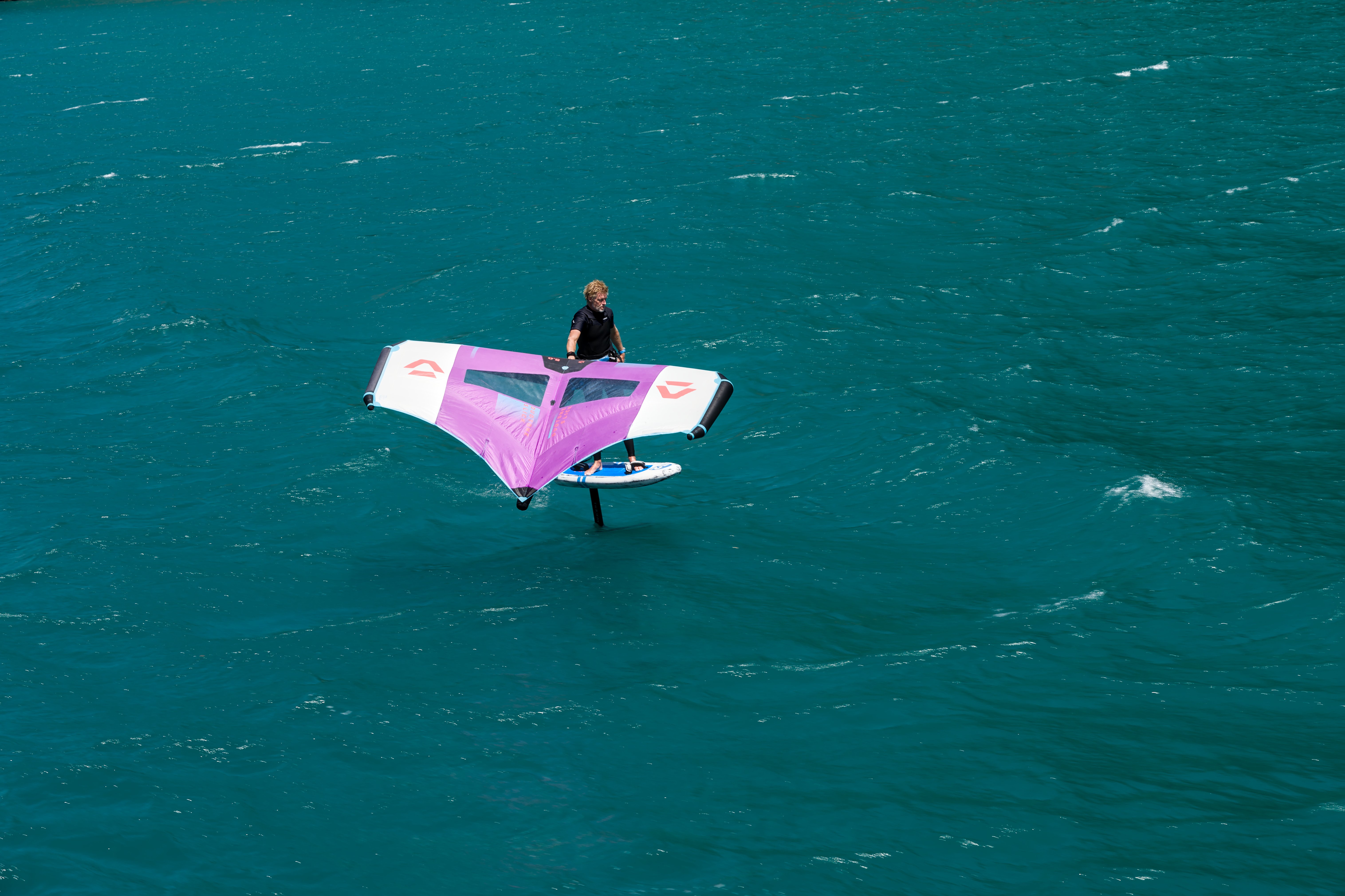 Exciting Wing Foiling Adventure on Swiss Lake · Free Stock Photo