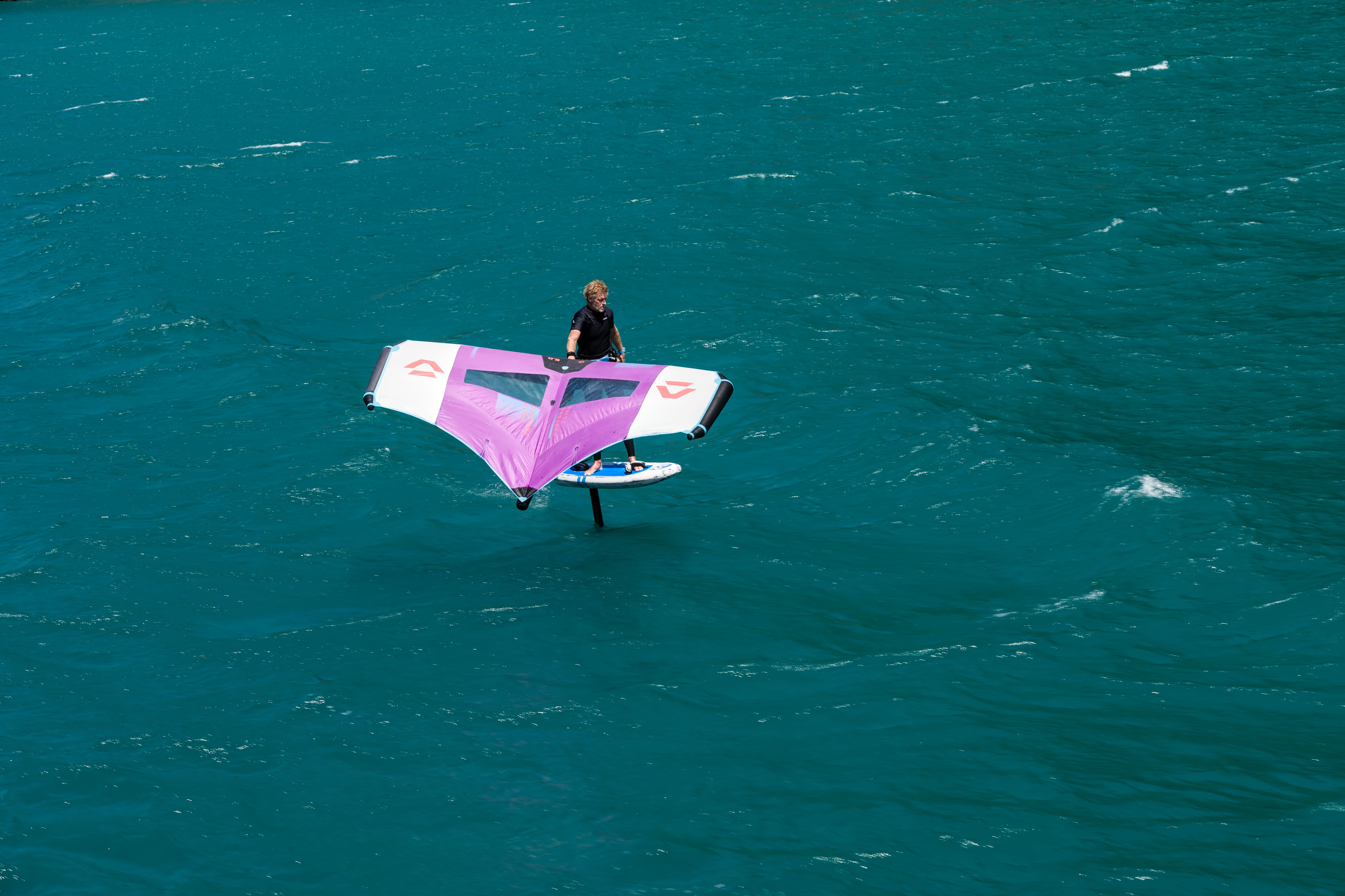 Exciting Wing Foiling Adventure on Swiss Lake · Free Stock Photo