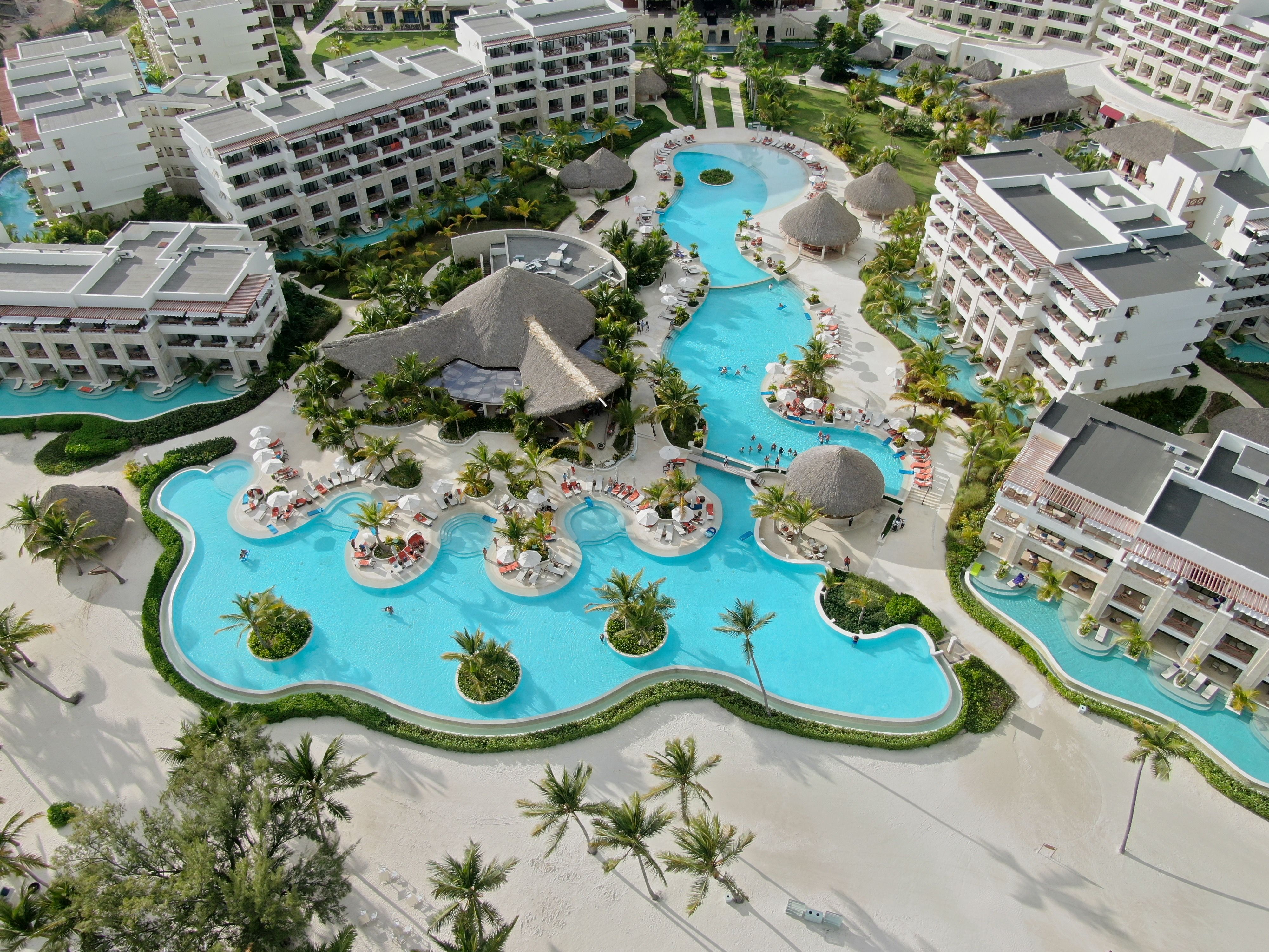 Aerial View of Tropical Resort with Pools · Free Stock Photo
