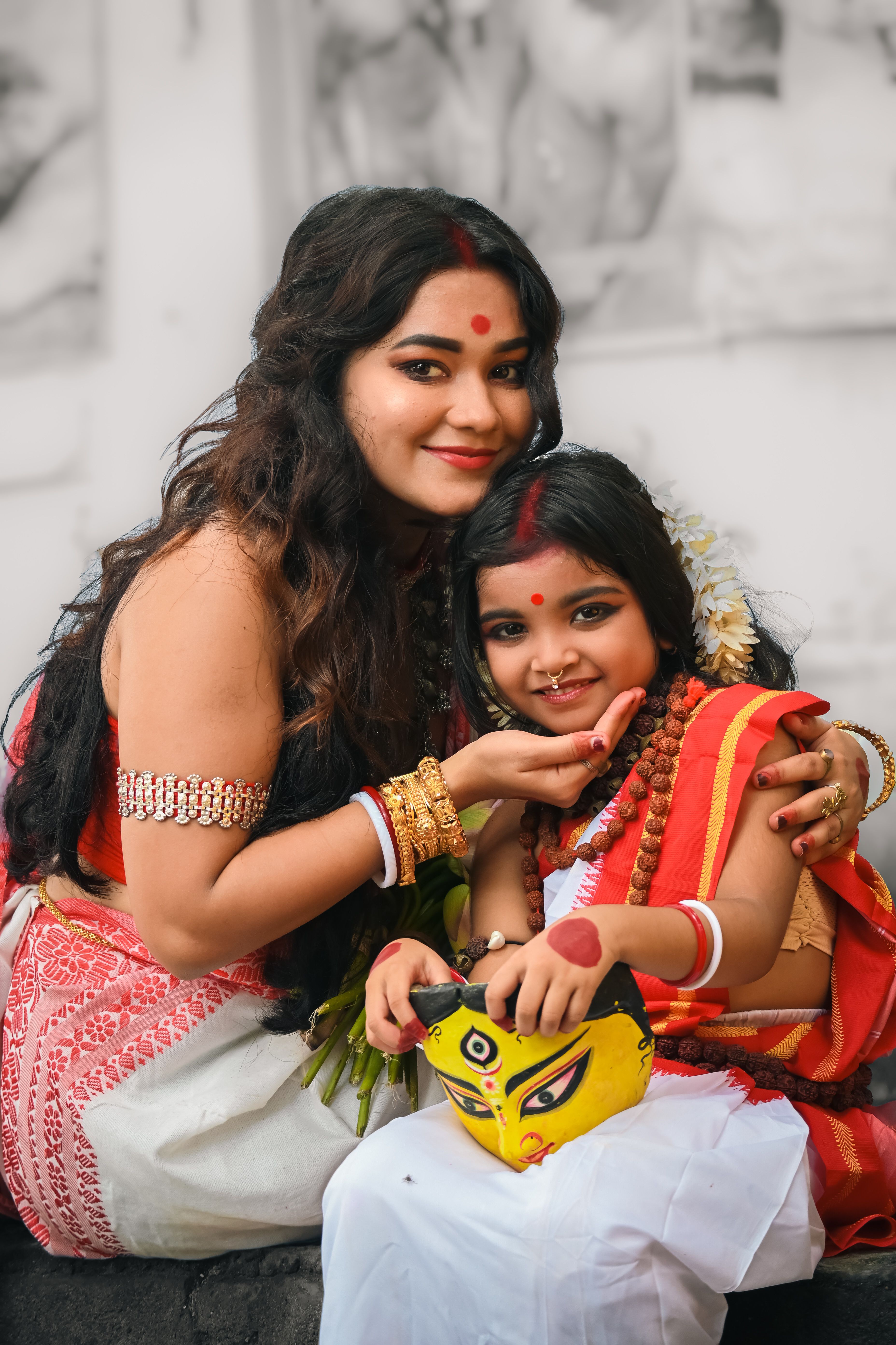 Mother and Child in Traditional Durga Puja Attire · Free Stock Photo