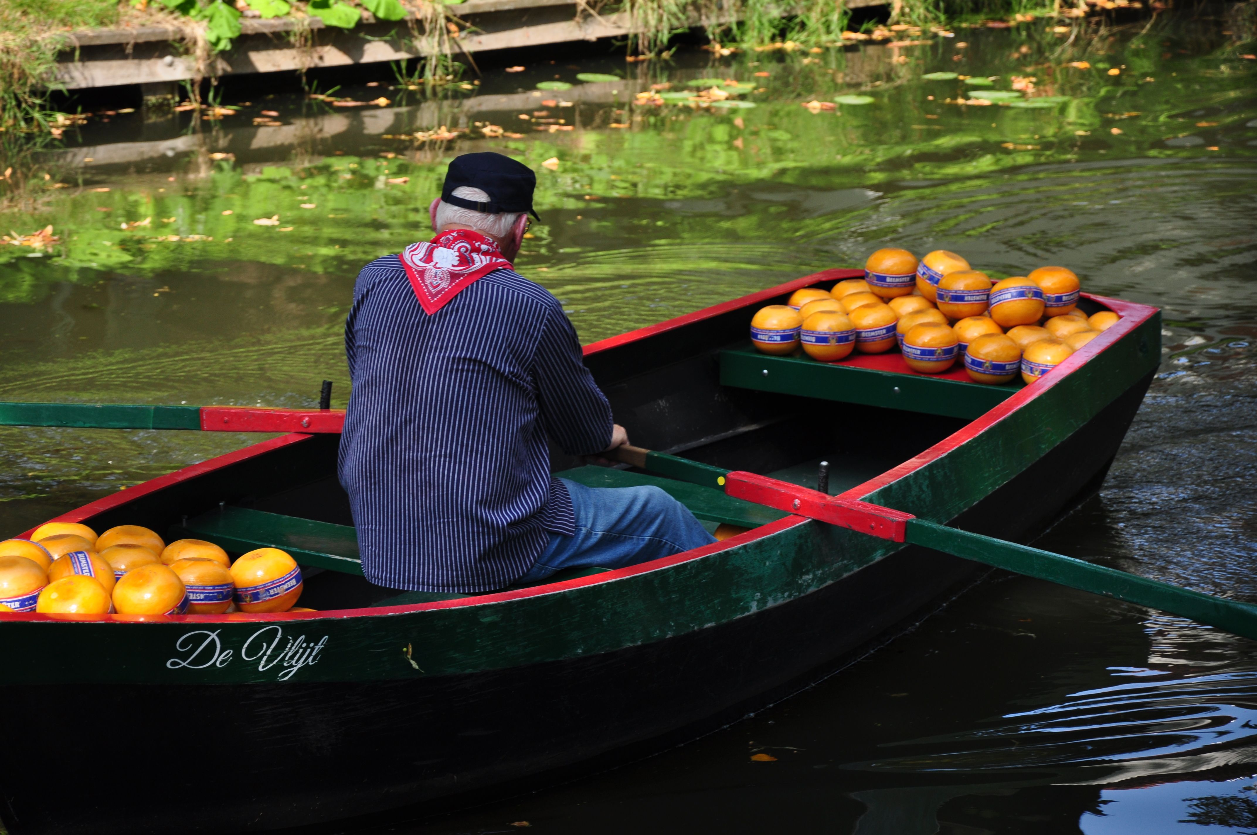 Traditional Dutch Cheese Boat on Amsterdam Canal · Free Stock Photo