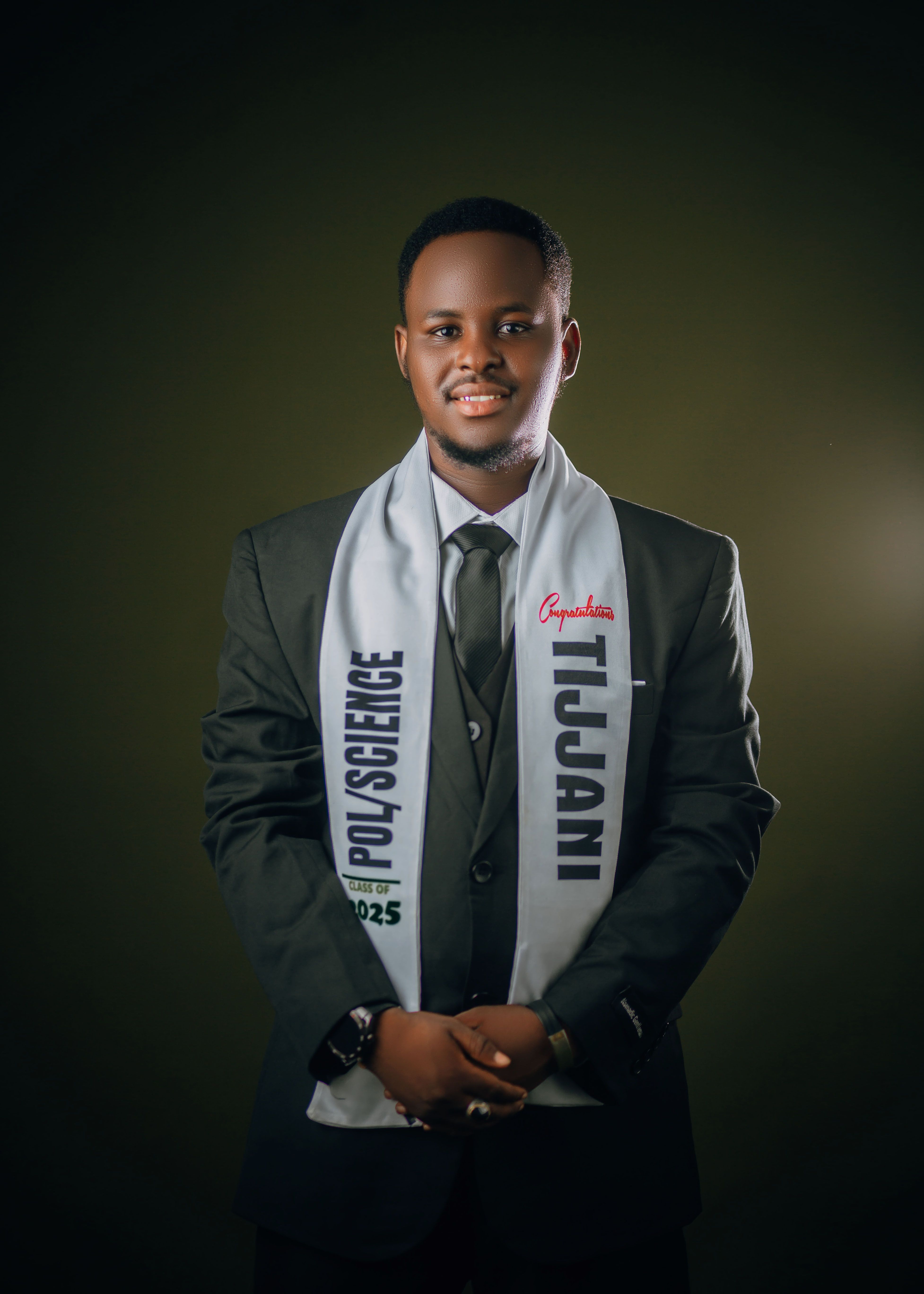 Formal Portrait of a Graduate in a Suit · Free Stock Photo