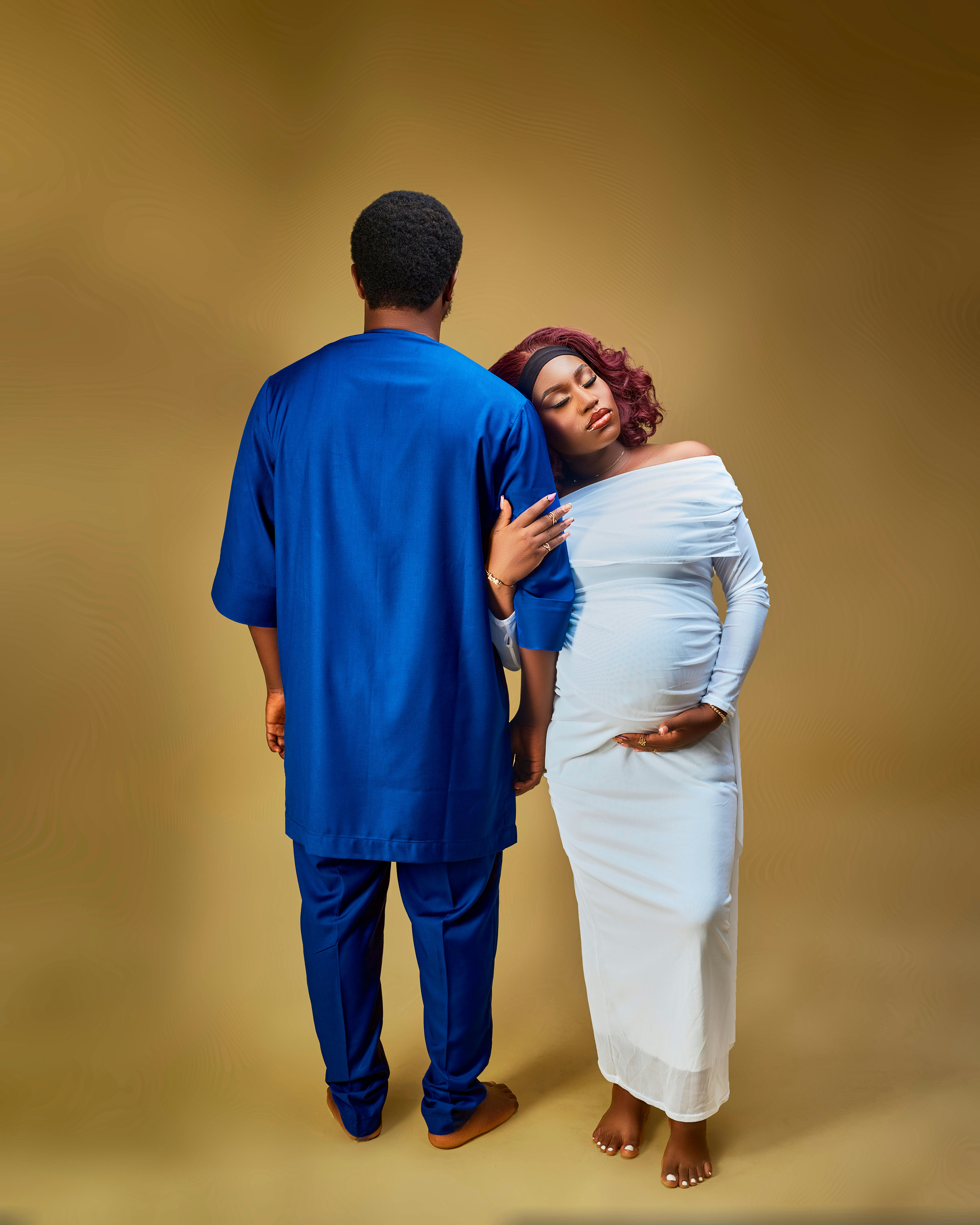Elegant Maternity Portrait in Studio Setting · Free Stock Photo