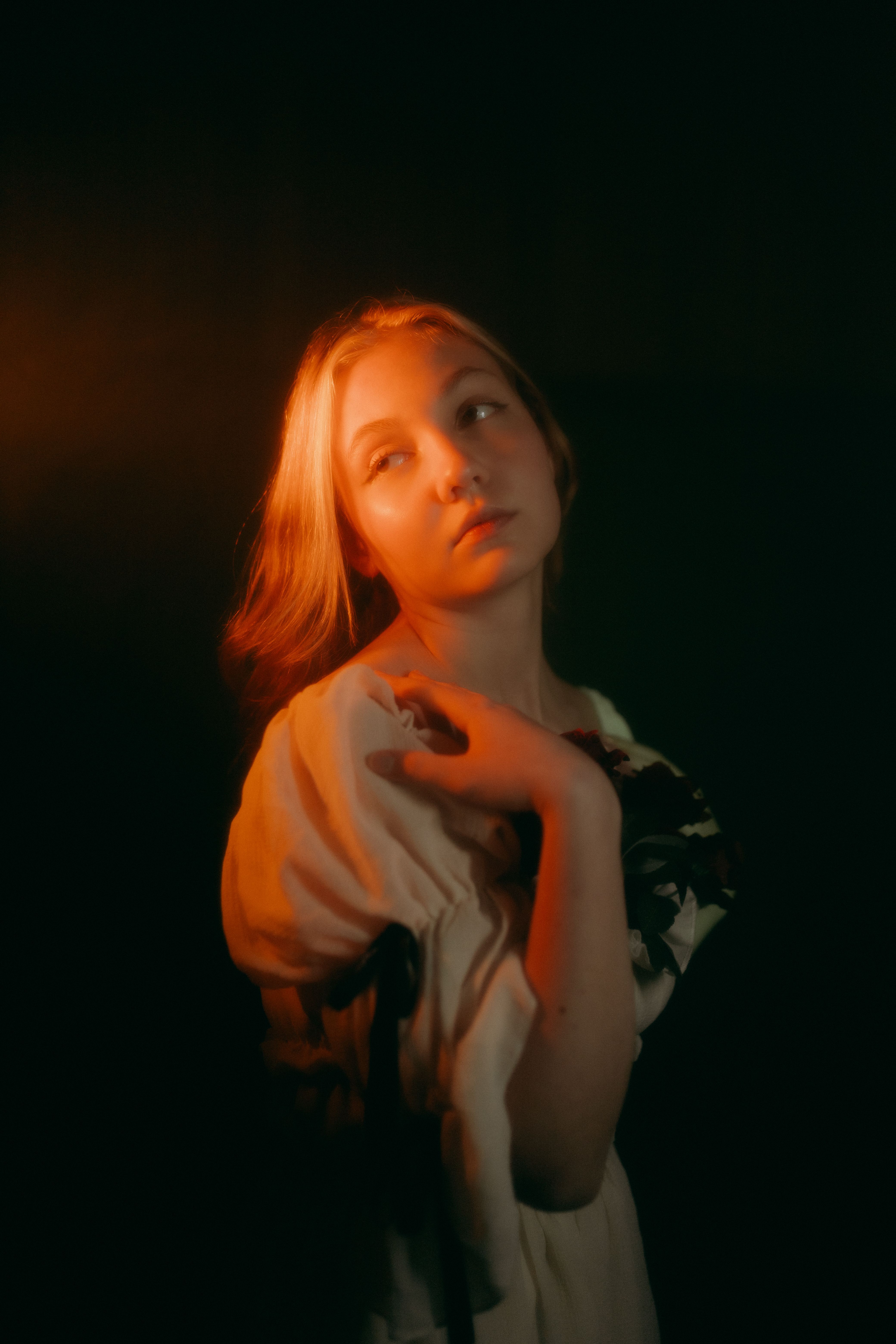 Artistic Portrait of Woman with Dramatic Lighting · Free Stock Photo