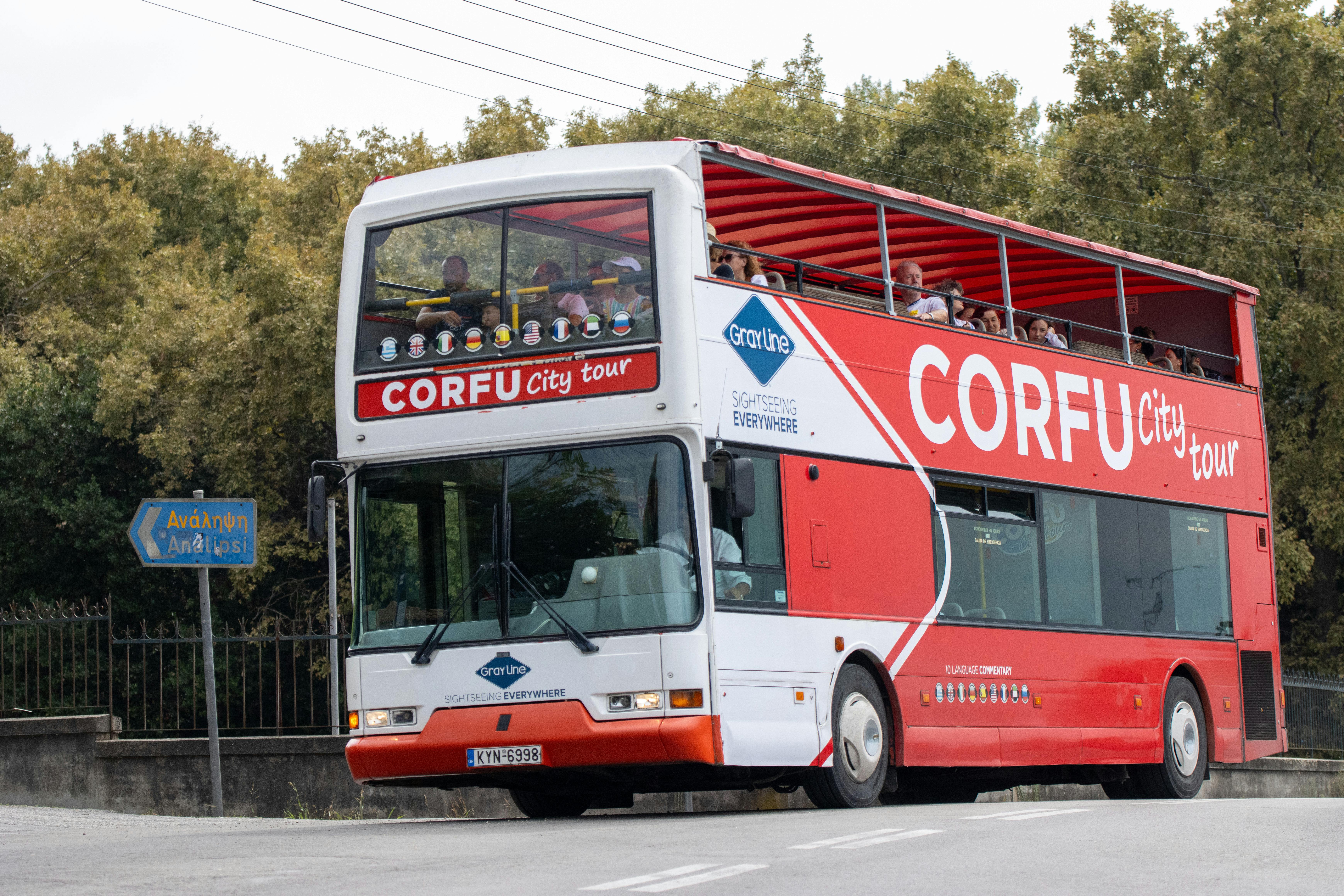 Red Open-Top Tour Bus in Corfu City, Greece · Free Stock Photo