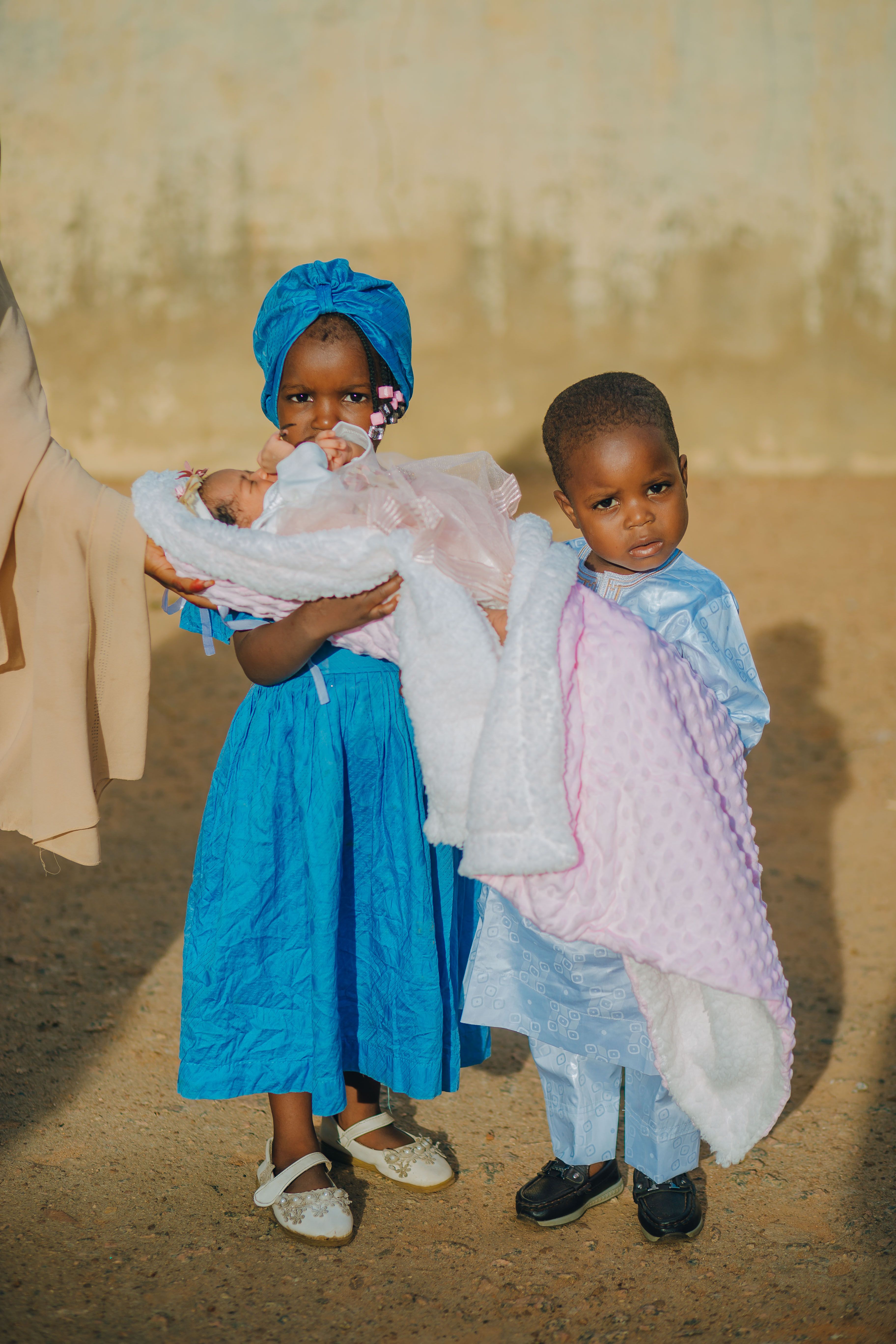 Traditional Nigerian Children with Infant Outdoors · Free Stock Photo