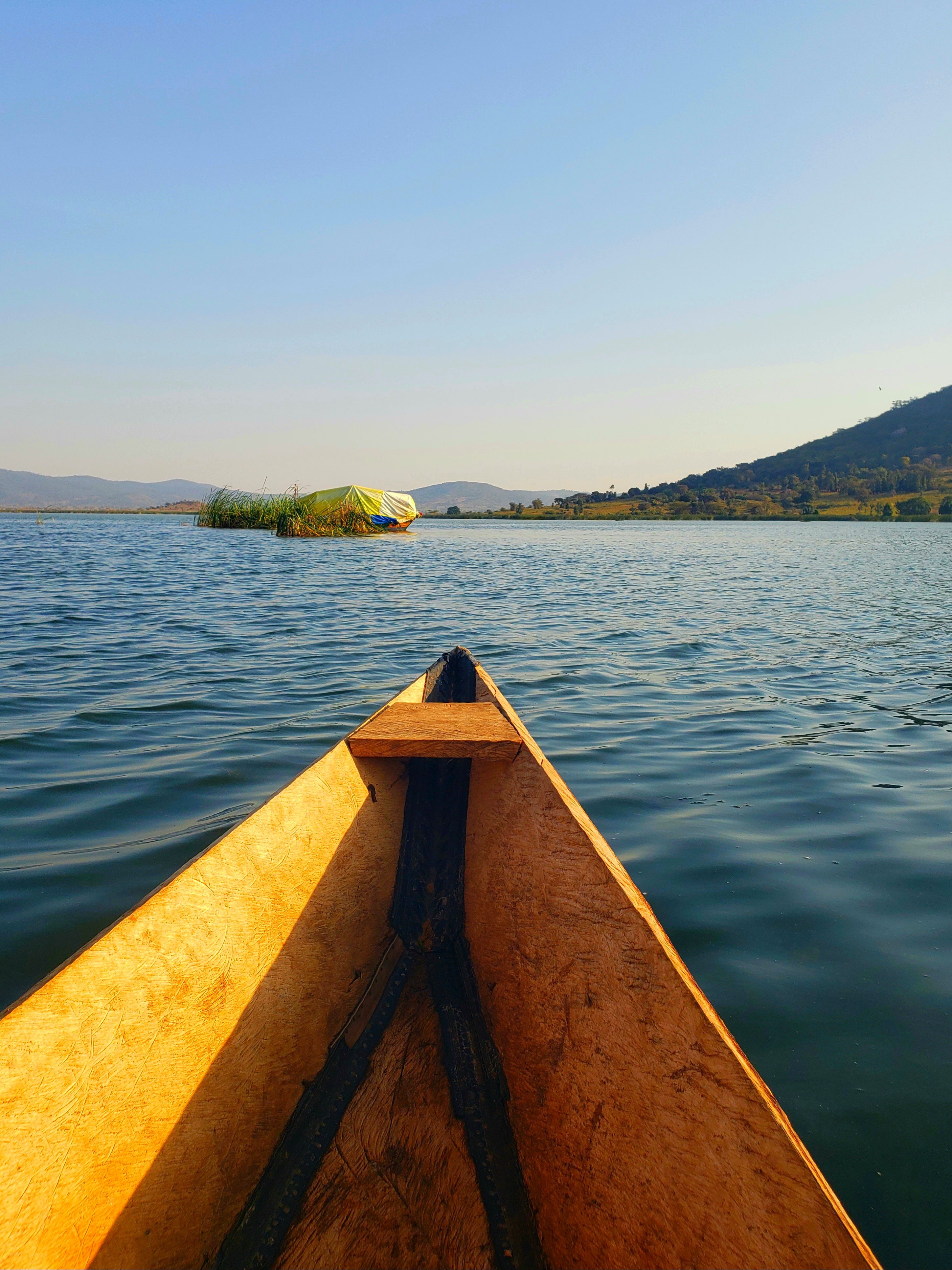 Serene Canoe View on Lake in Tanzania · Free Stock Photo