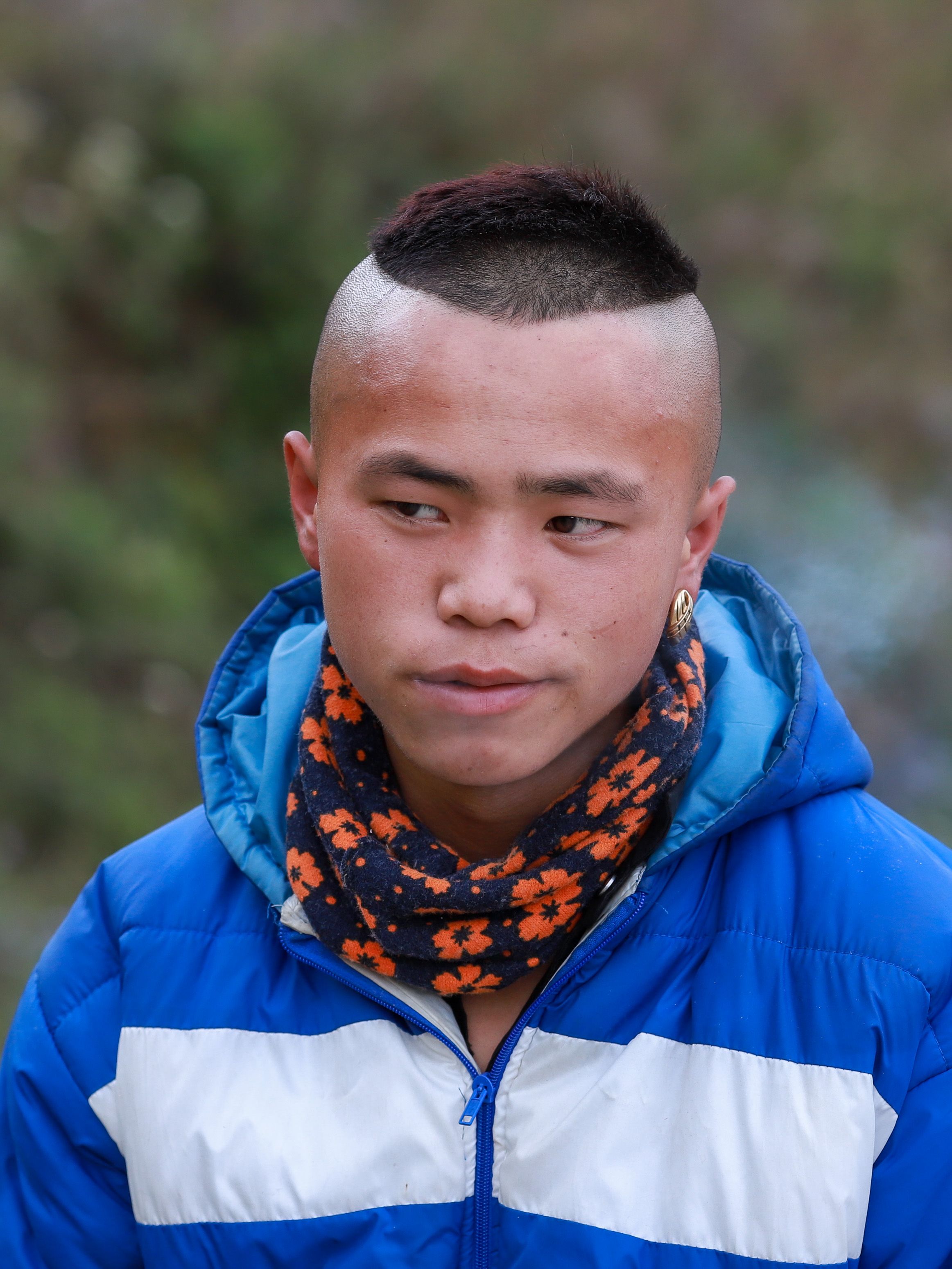 Young Man in Colorful Scarf during Winter in Lào Cai · Free Stock Photo