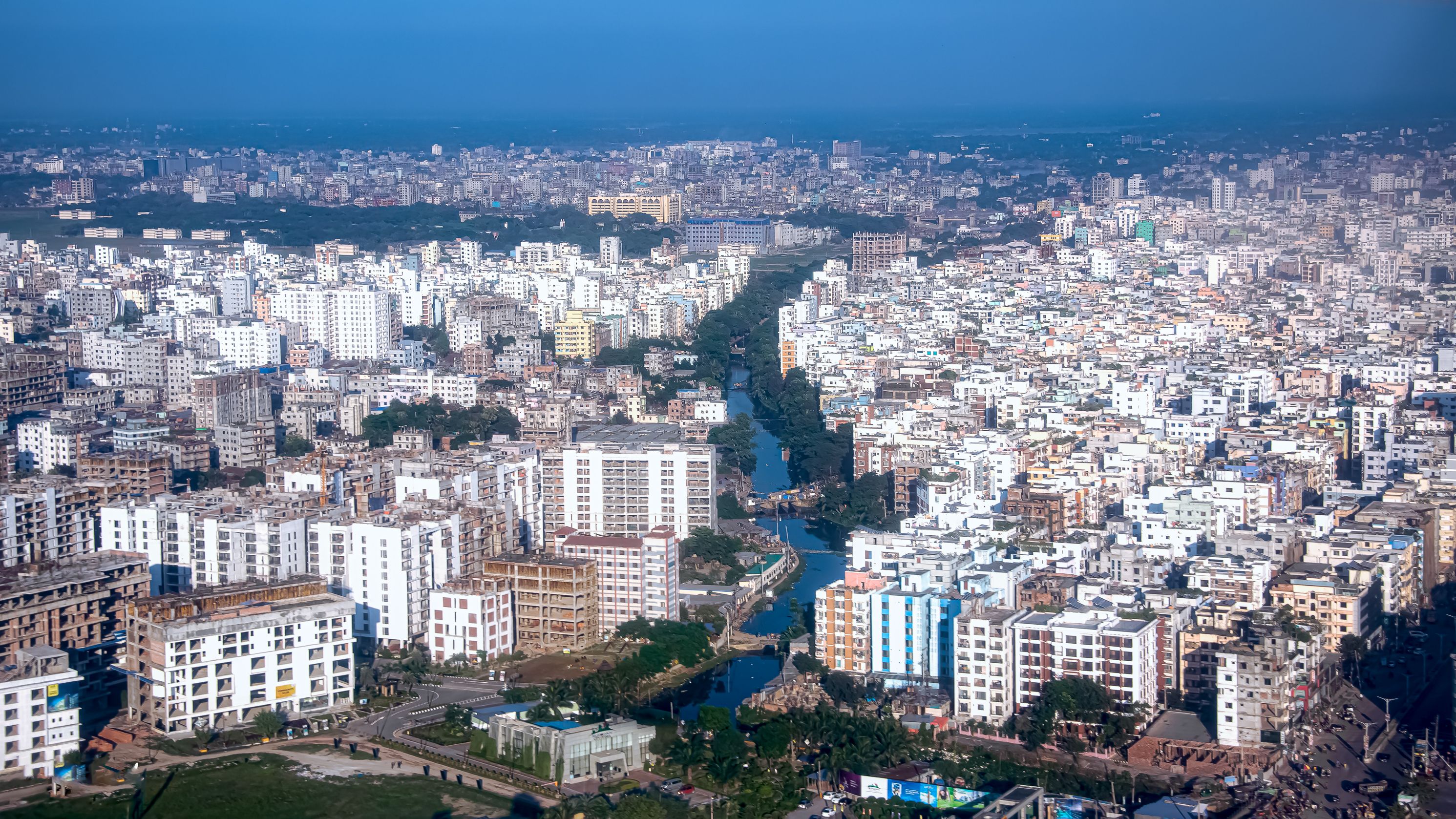 Aerial View of Dhaka Cityscape with Canal · Free Stock Photo
