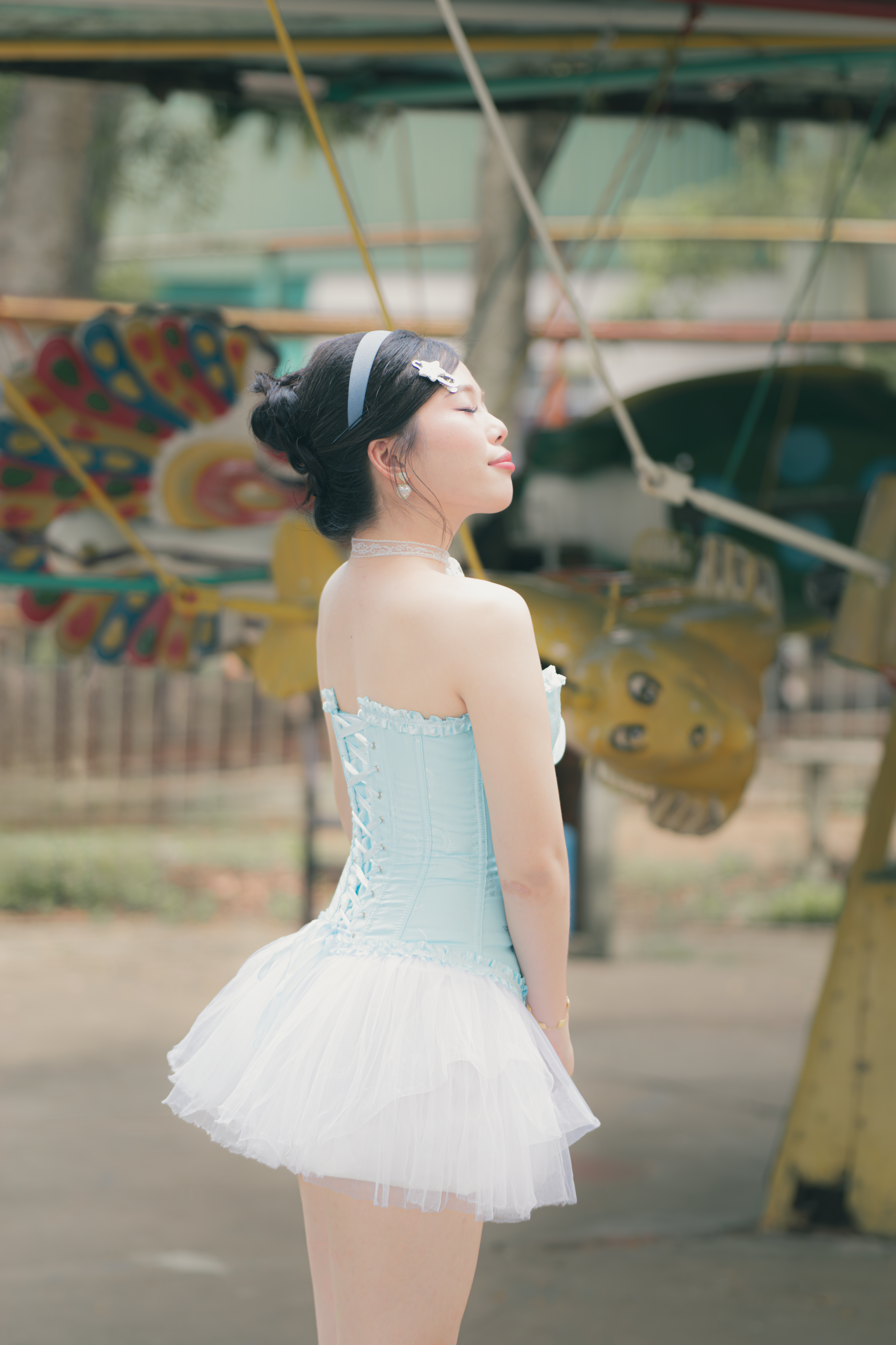 Ballet Dancer in Tutu at Amusement Park · Free Stock Photo