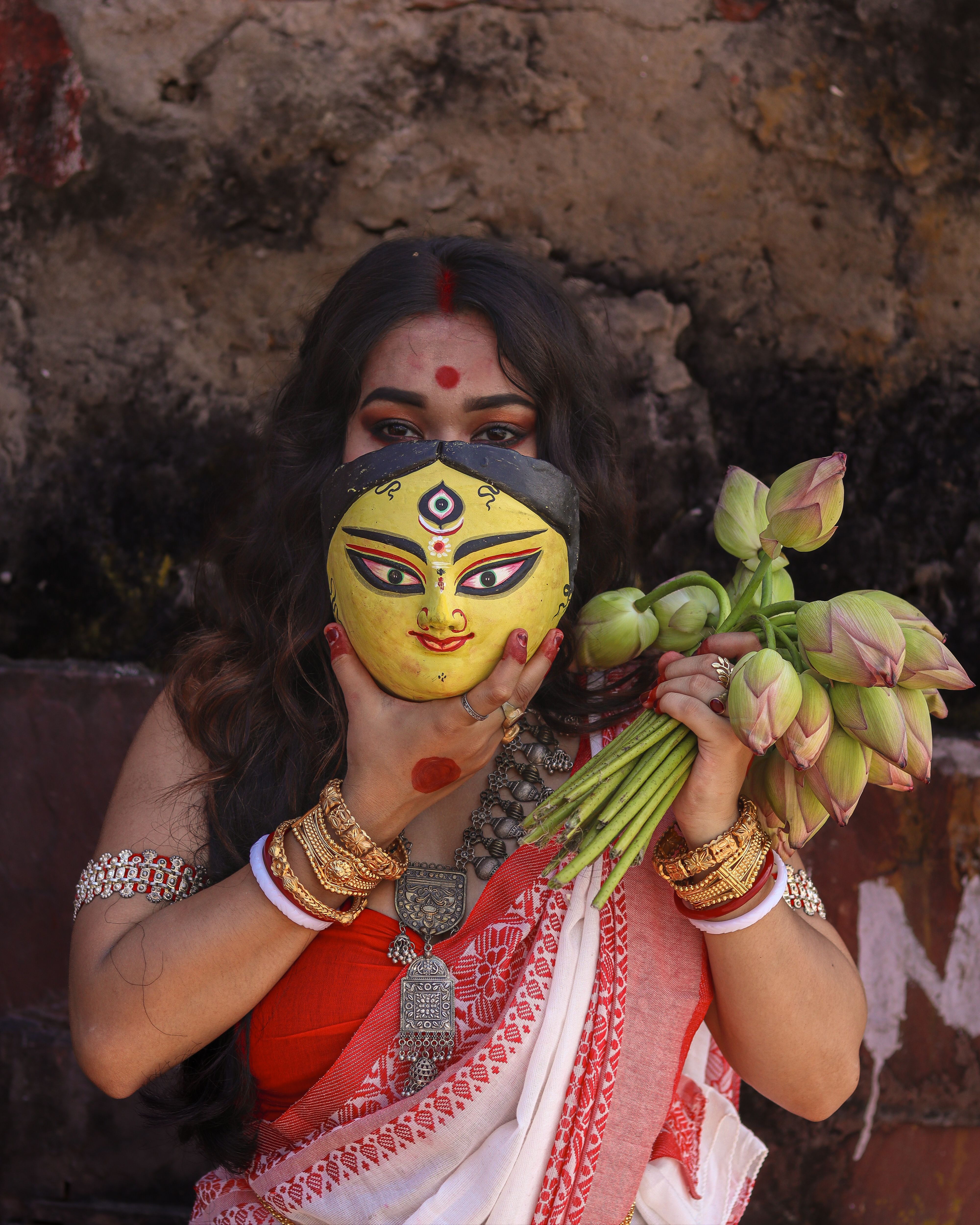 Traditional Indian Woman with Durga Mask and Lotus · Free Stock Photo