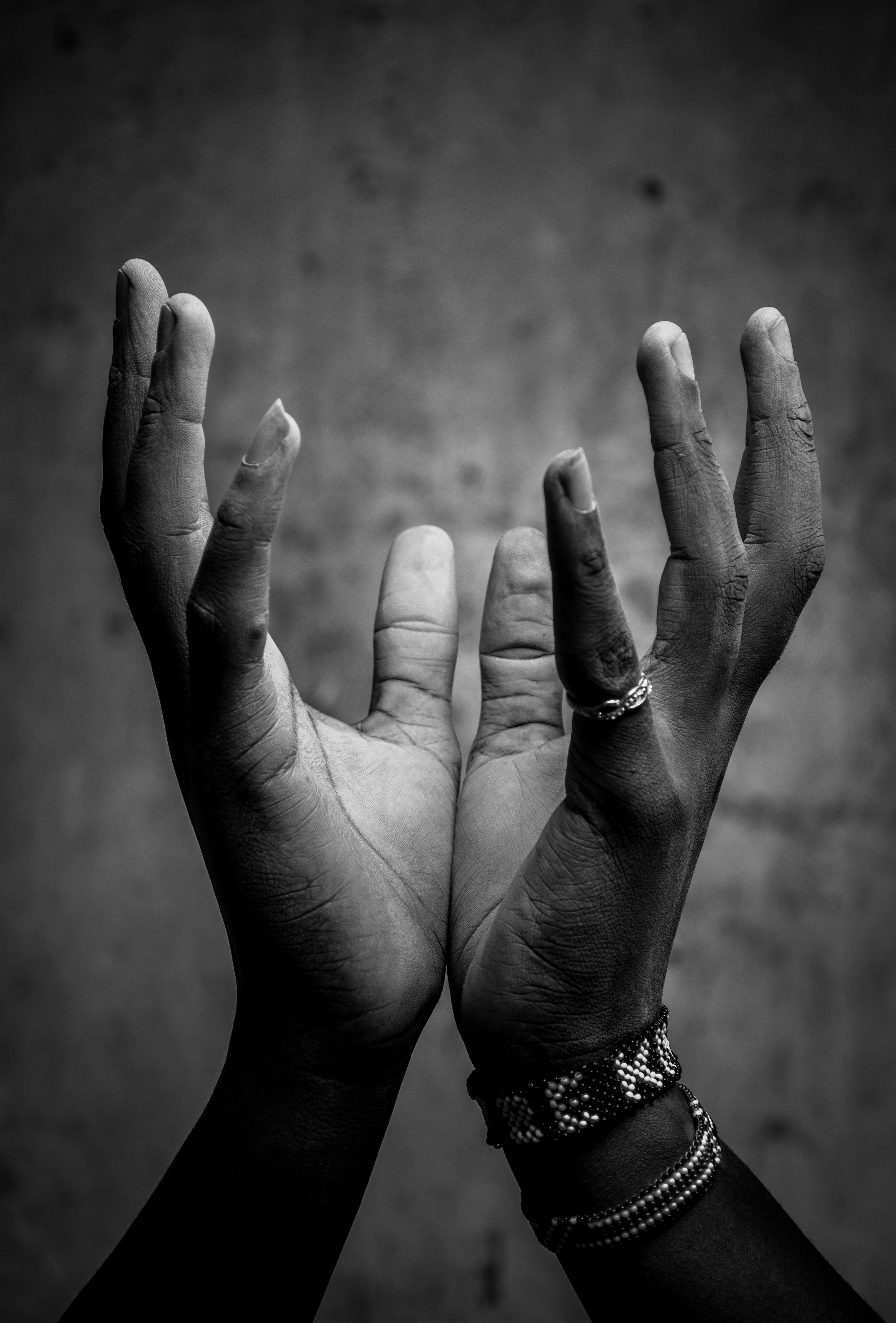 Expressive Hands in Black and White Portrait · Free Stock Photo