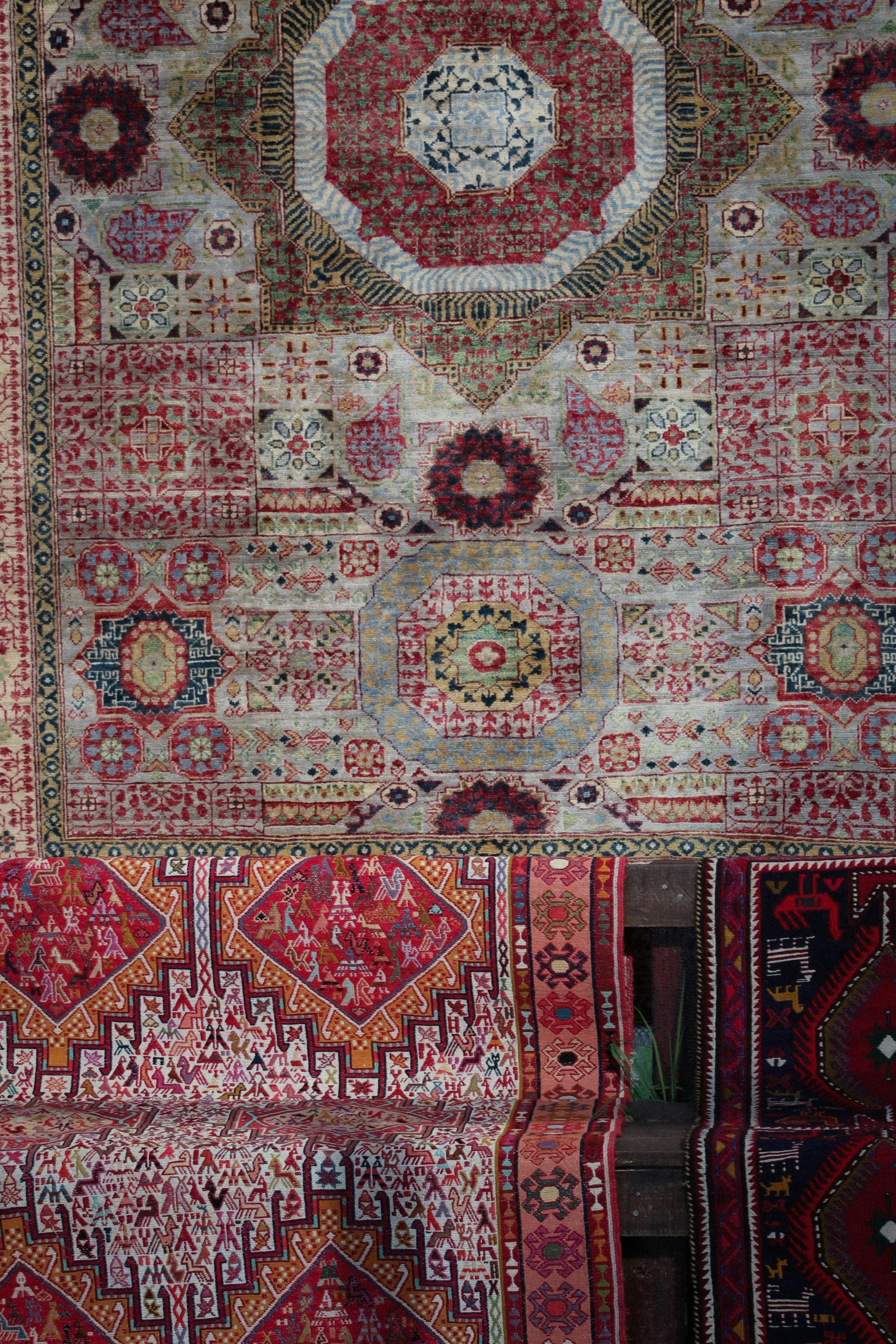 Colorful Traditional Persian Rugs Display · Free Stock Photo