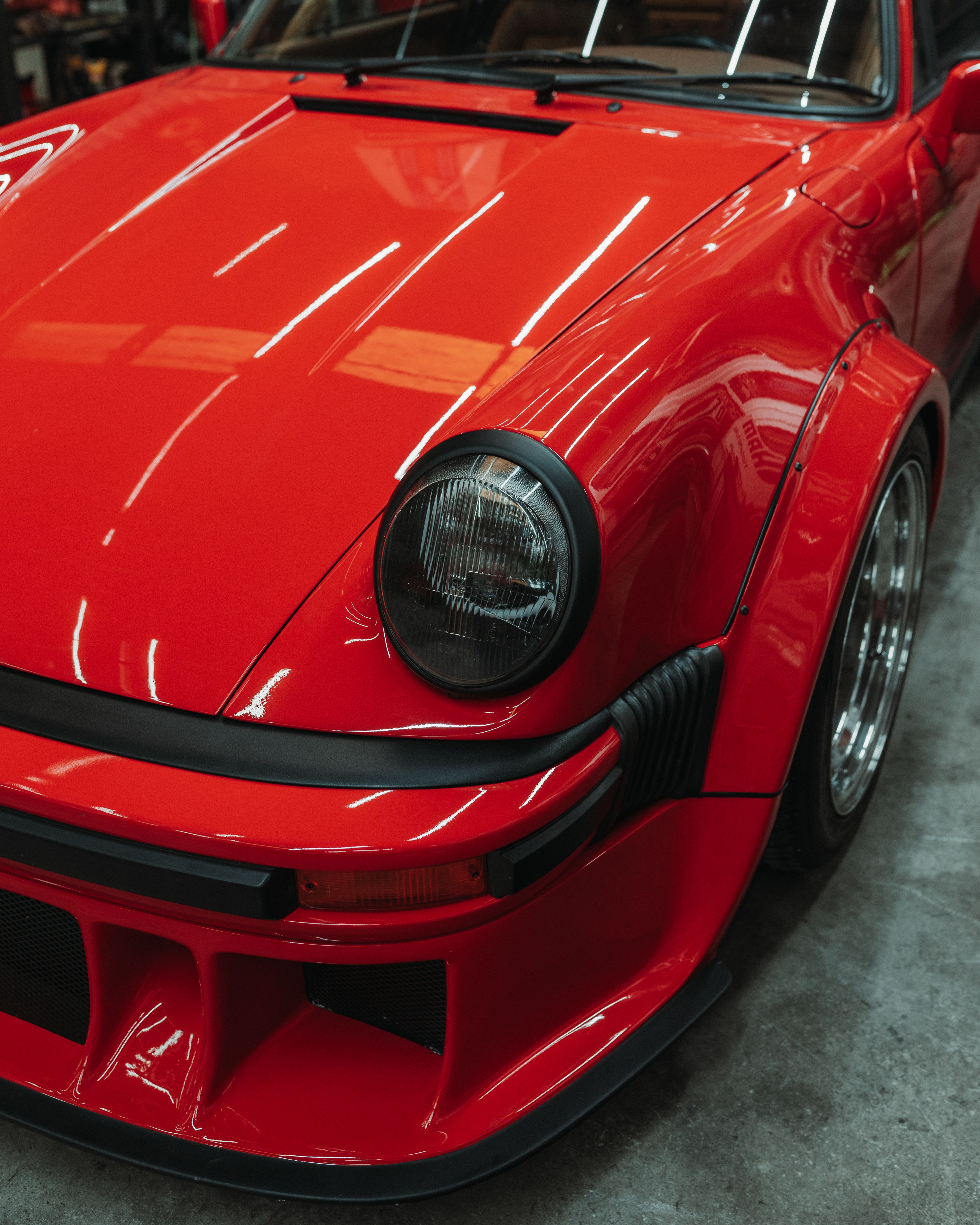 Vintage Red Racecar in Auto Shop · Free Stock Photo